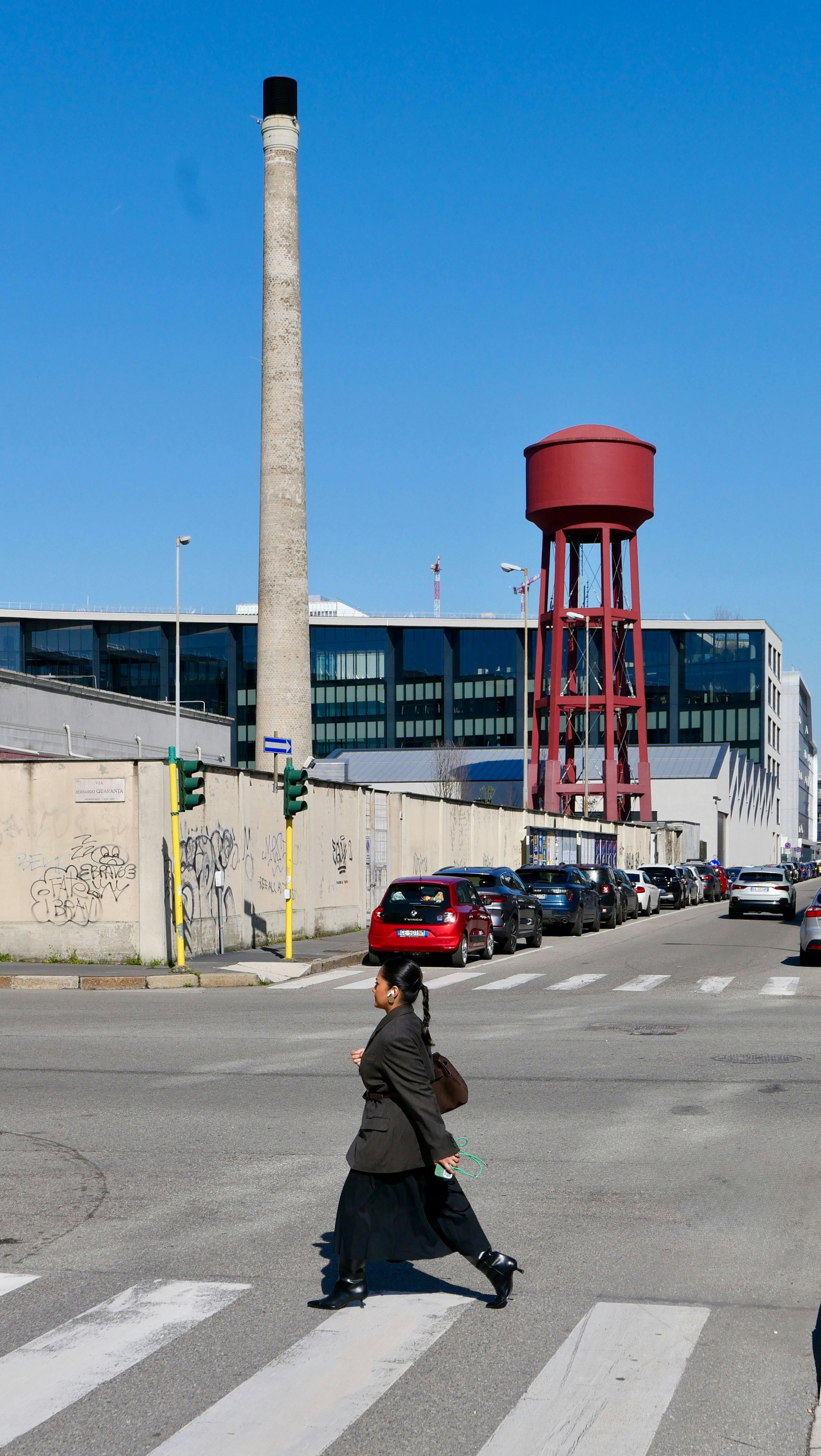 Crosswalk Echo: A Pedestrian in a City of Contrasts