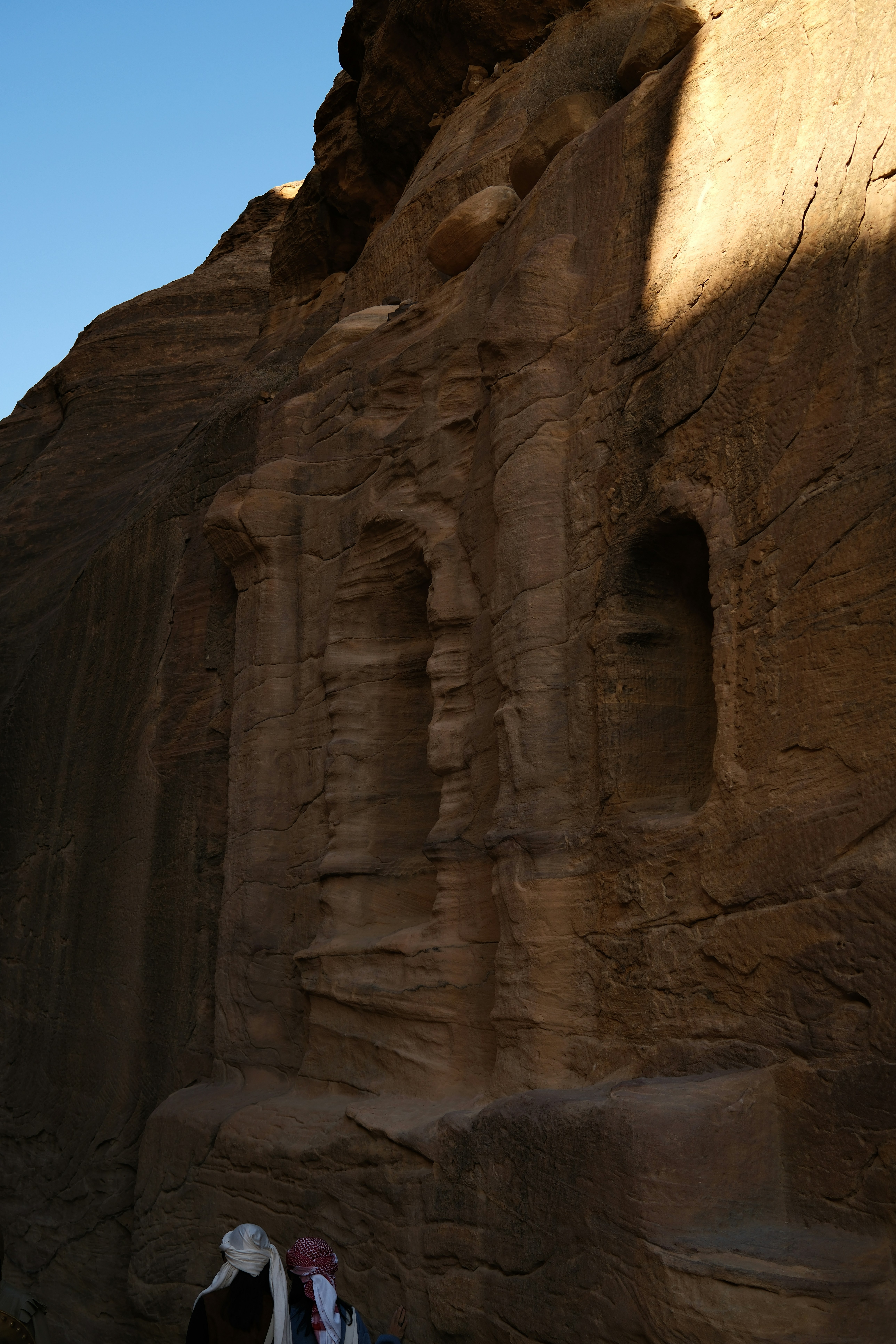 Echoes in the Canyon: Carved Alcoves and Morning Light