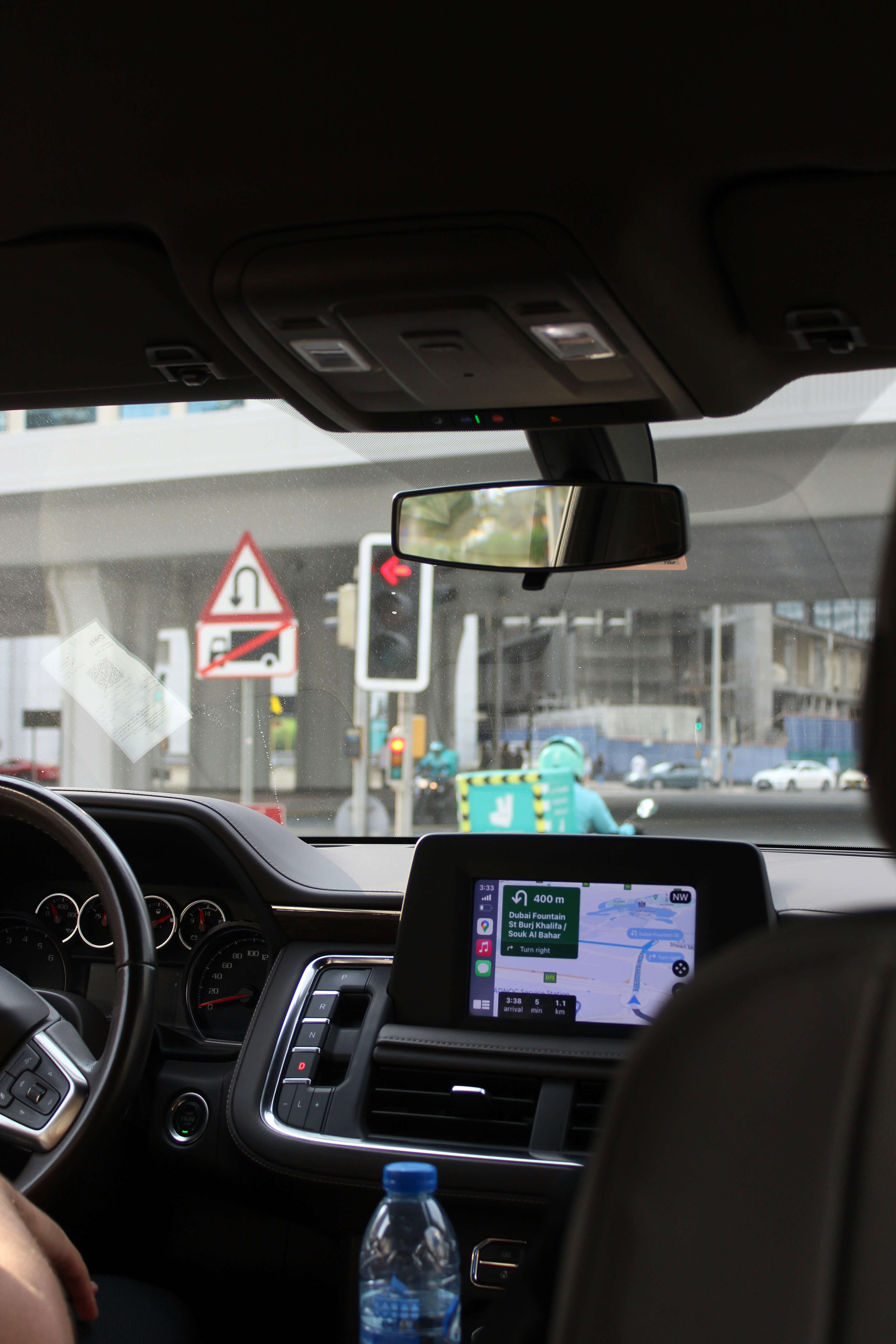 Dashboard View Through Windscreen: A Taxi's Interior at a Construction Zone