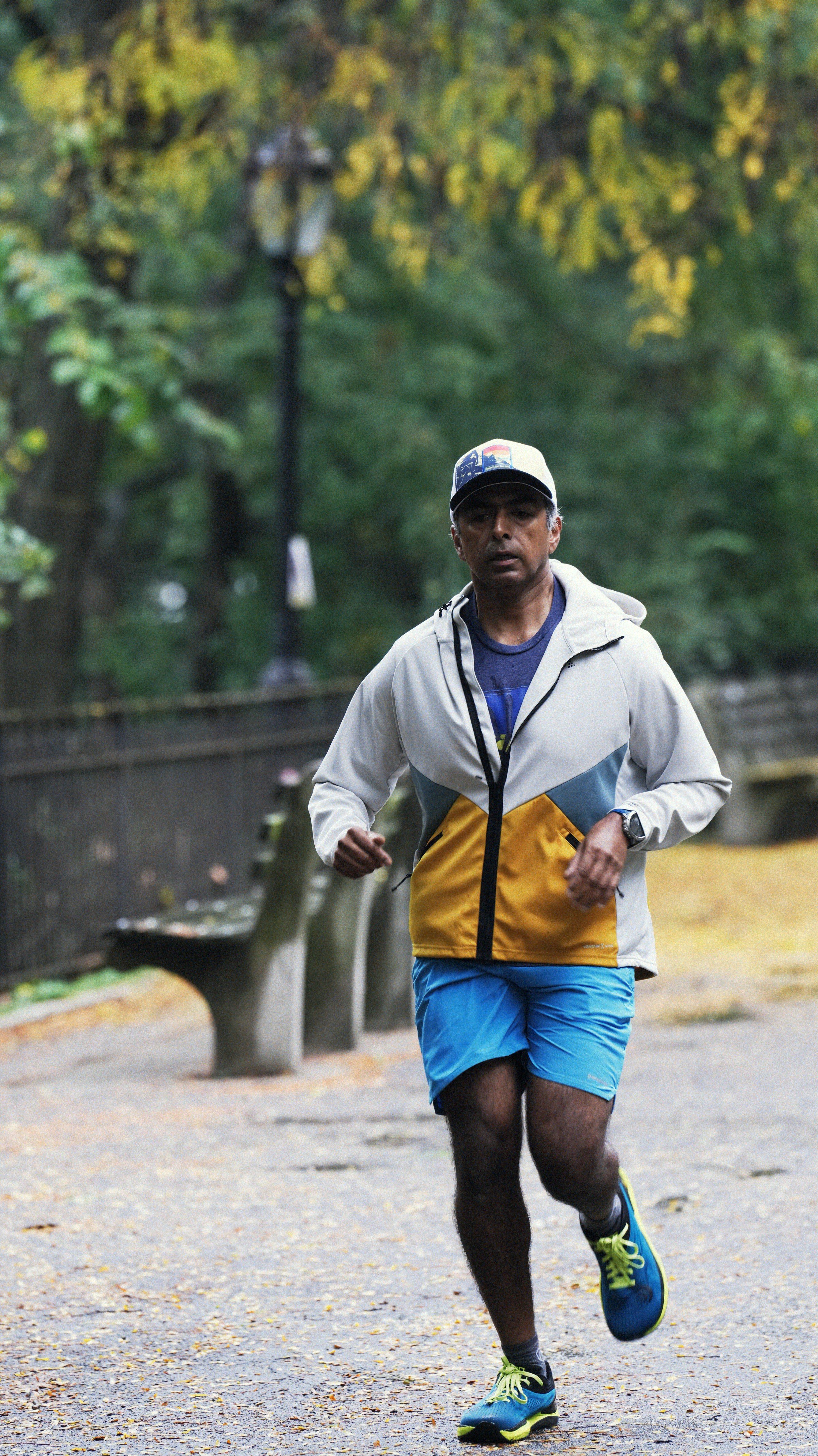 Runner in a park: Autumn light and a splash of color