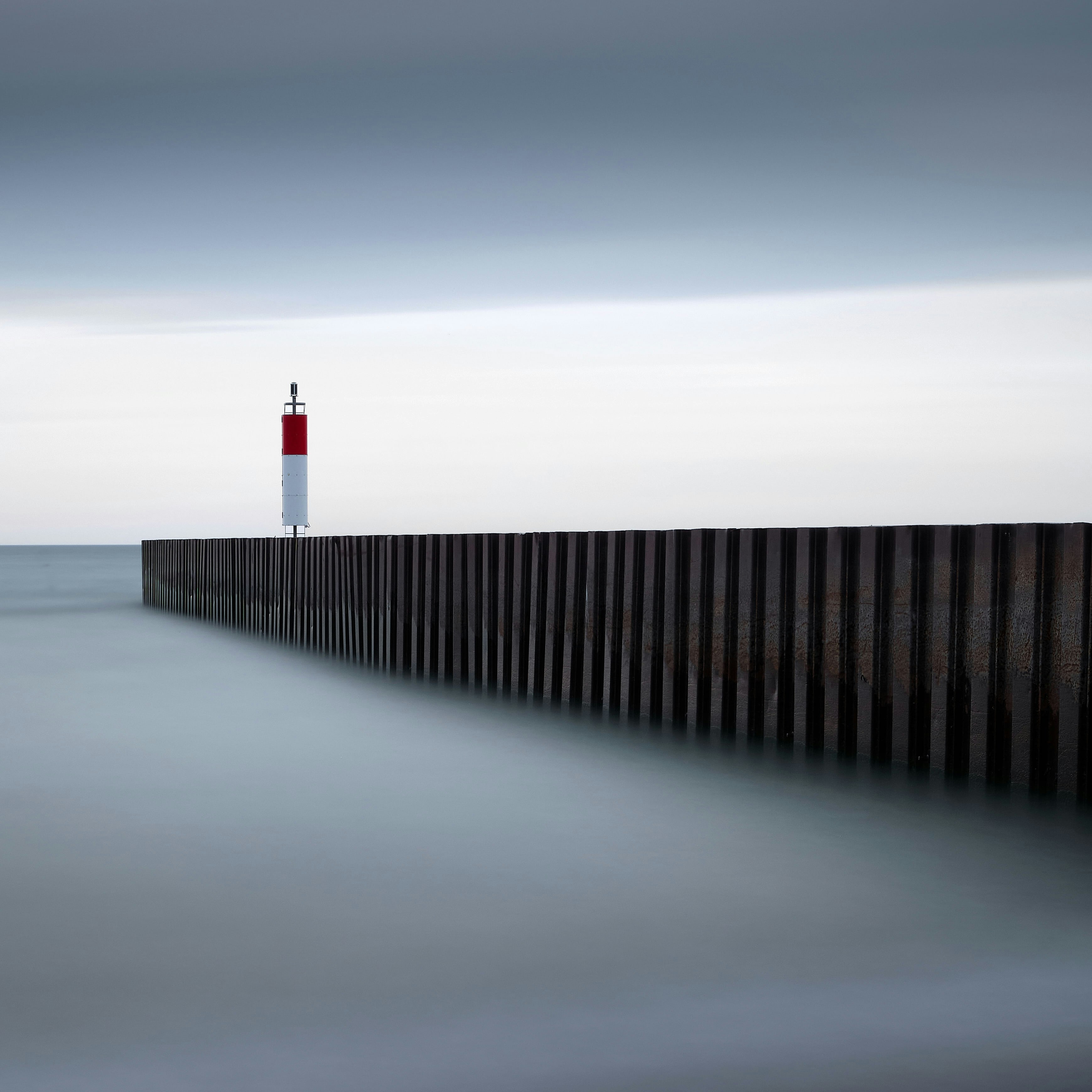 Long Break: A Pier Reaching Toward a Quiet Horizon