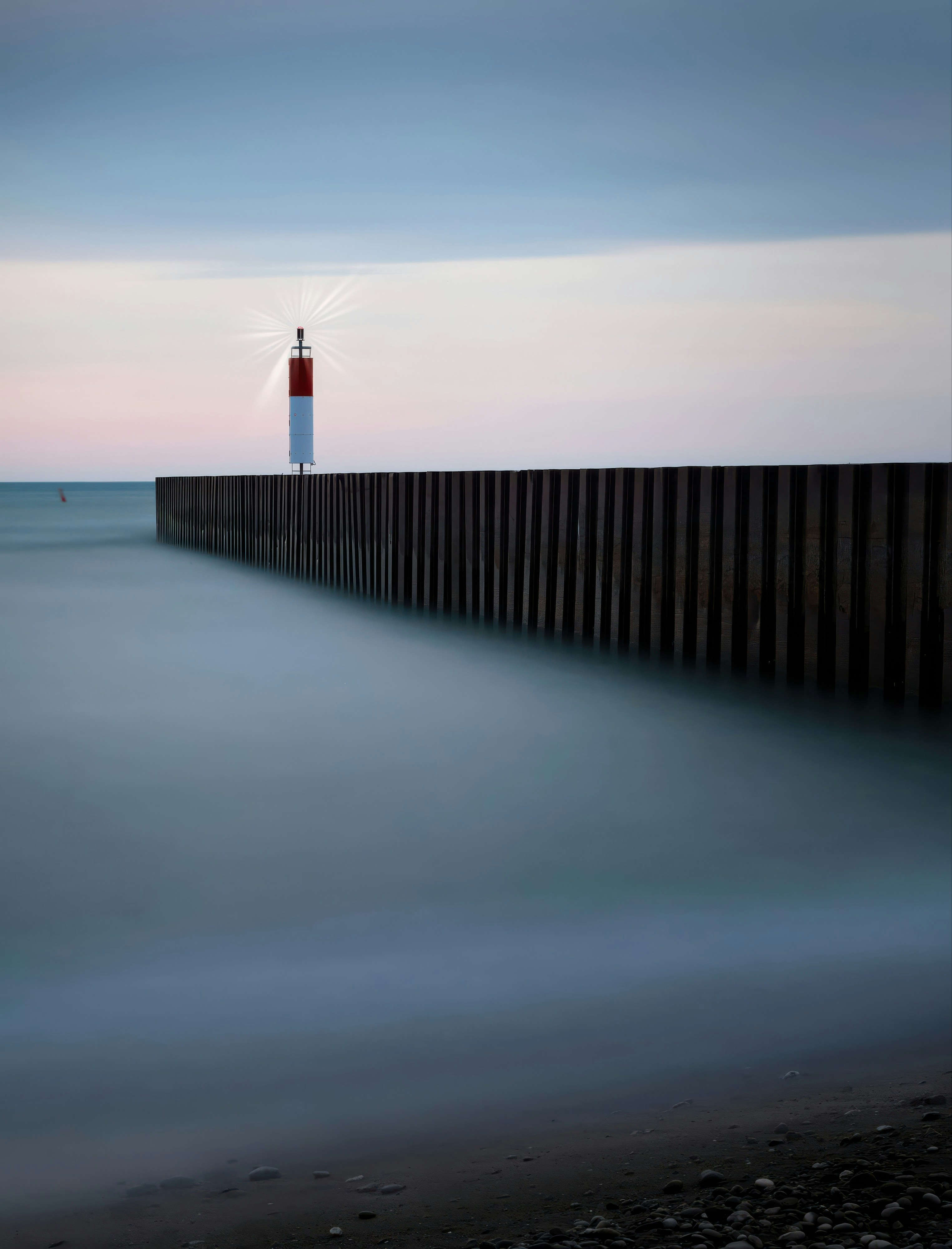 Lighthouse at the Veil of Sea and Sky