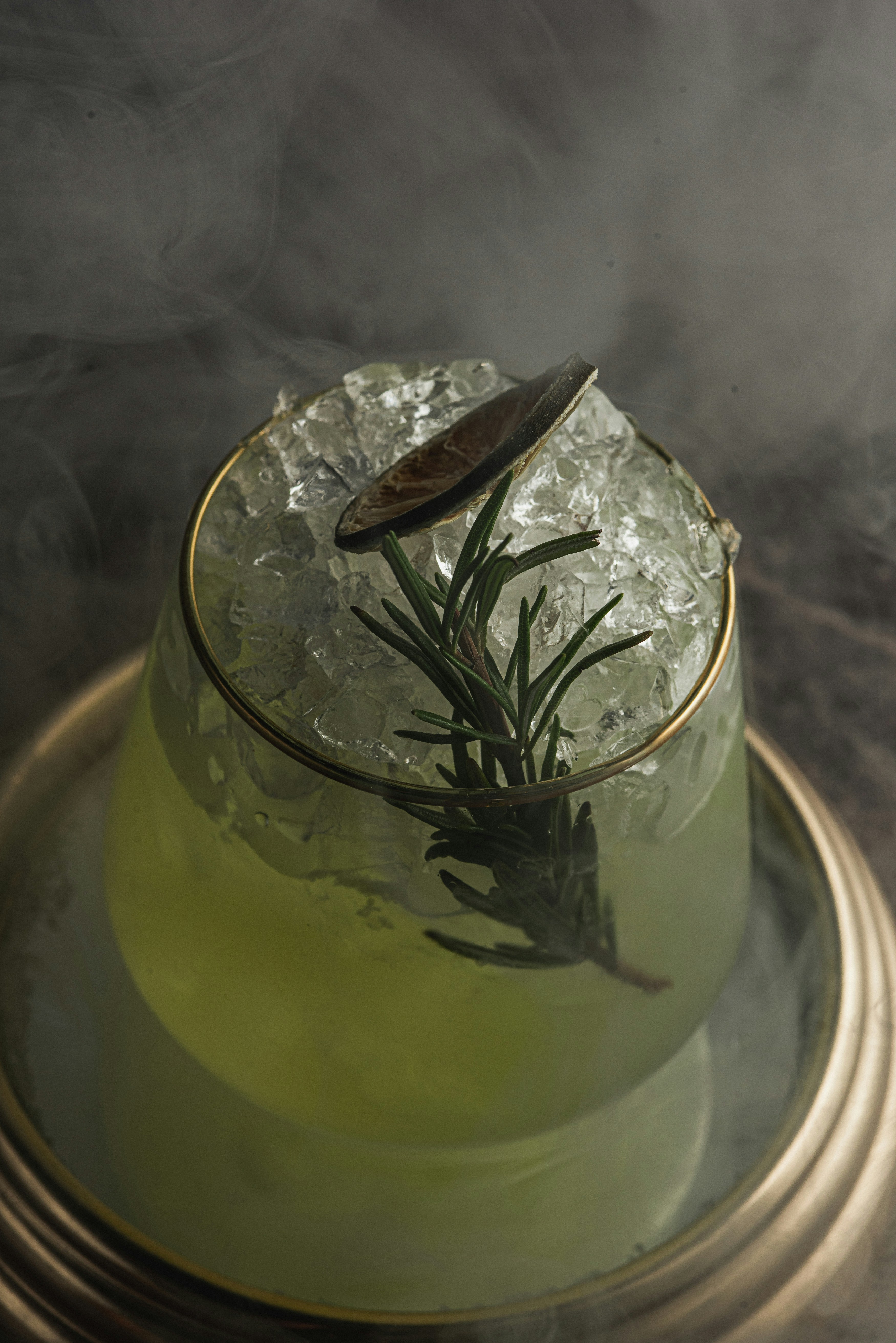 Herb Ringed in Steam: Rosemary Adrift in a Citrus Glow