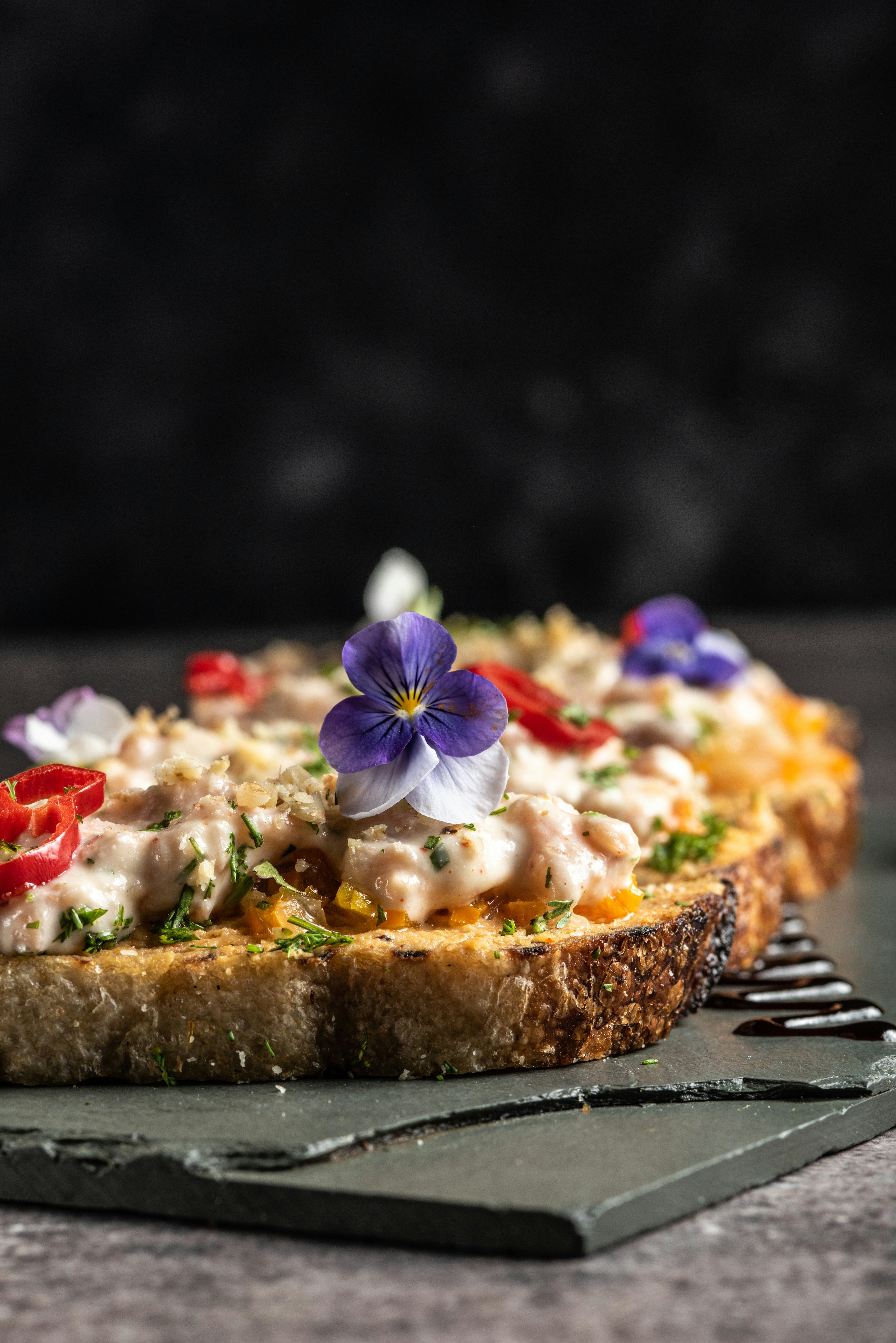 Edible Bloom: A Herb-Butter Crunch Tartine with Purple Edges