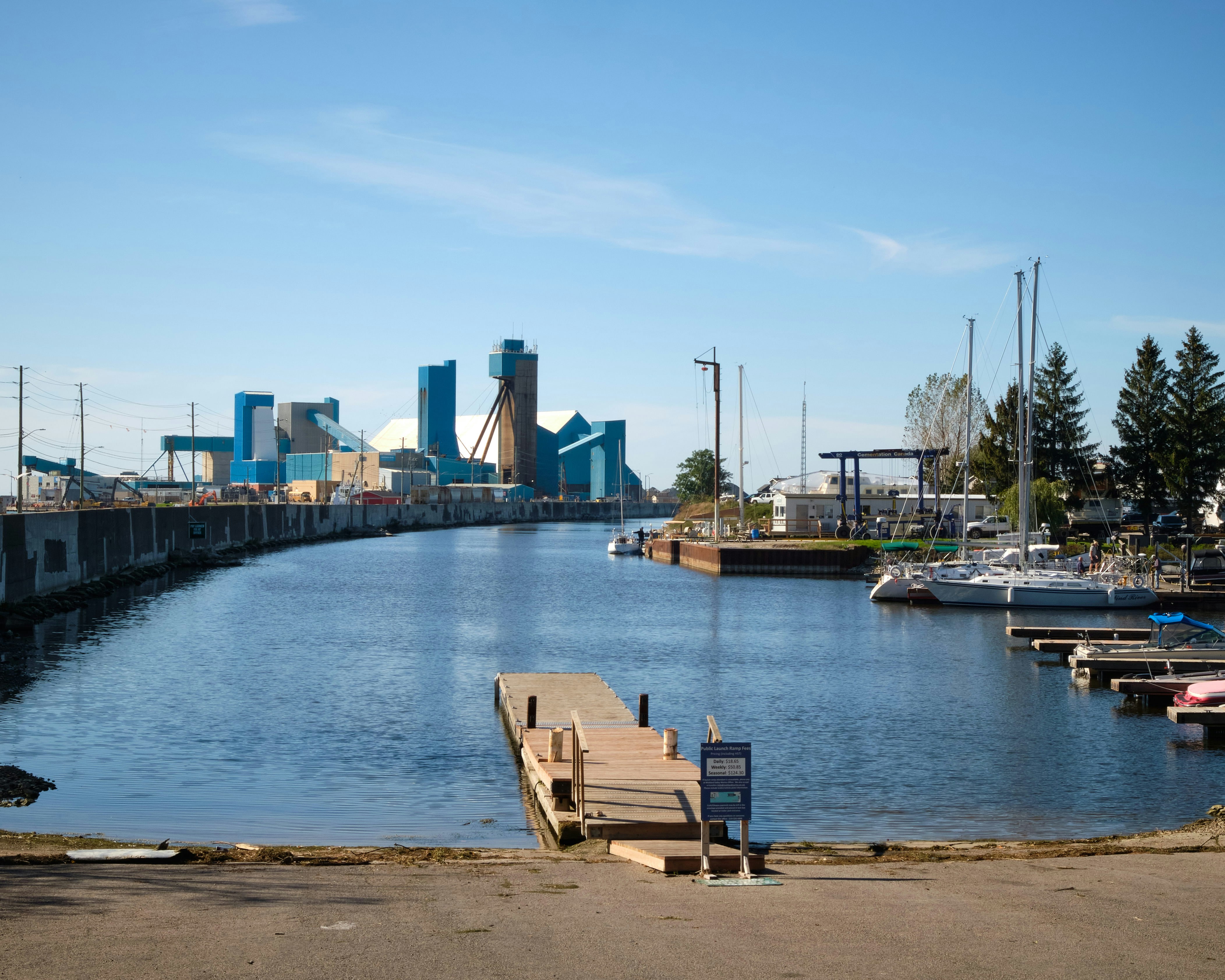 Industrial Blue Echo: Waterfront Docks Meet Modern Silos