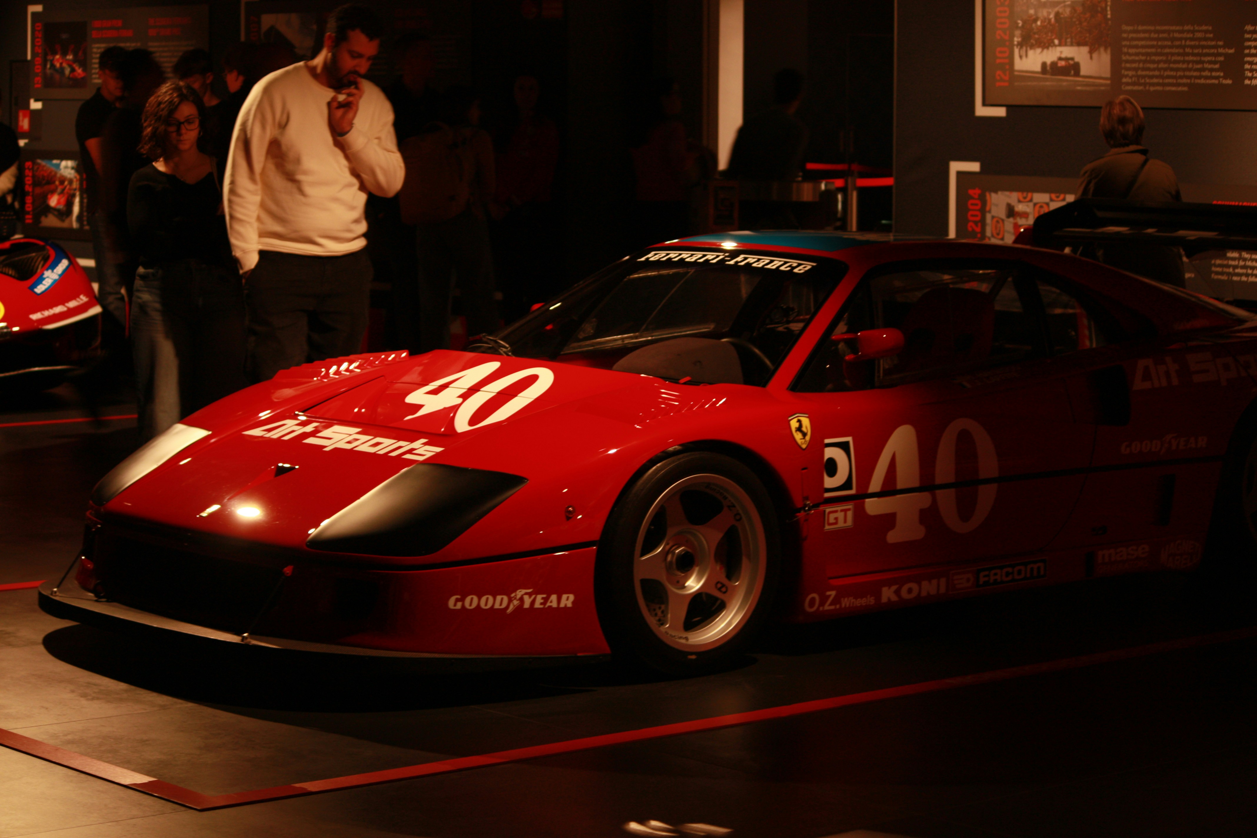 Red Prancing Power: A Classic Ferrari 40 sits under museum lights