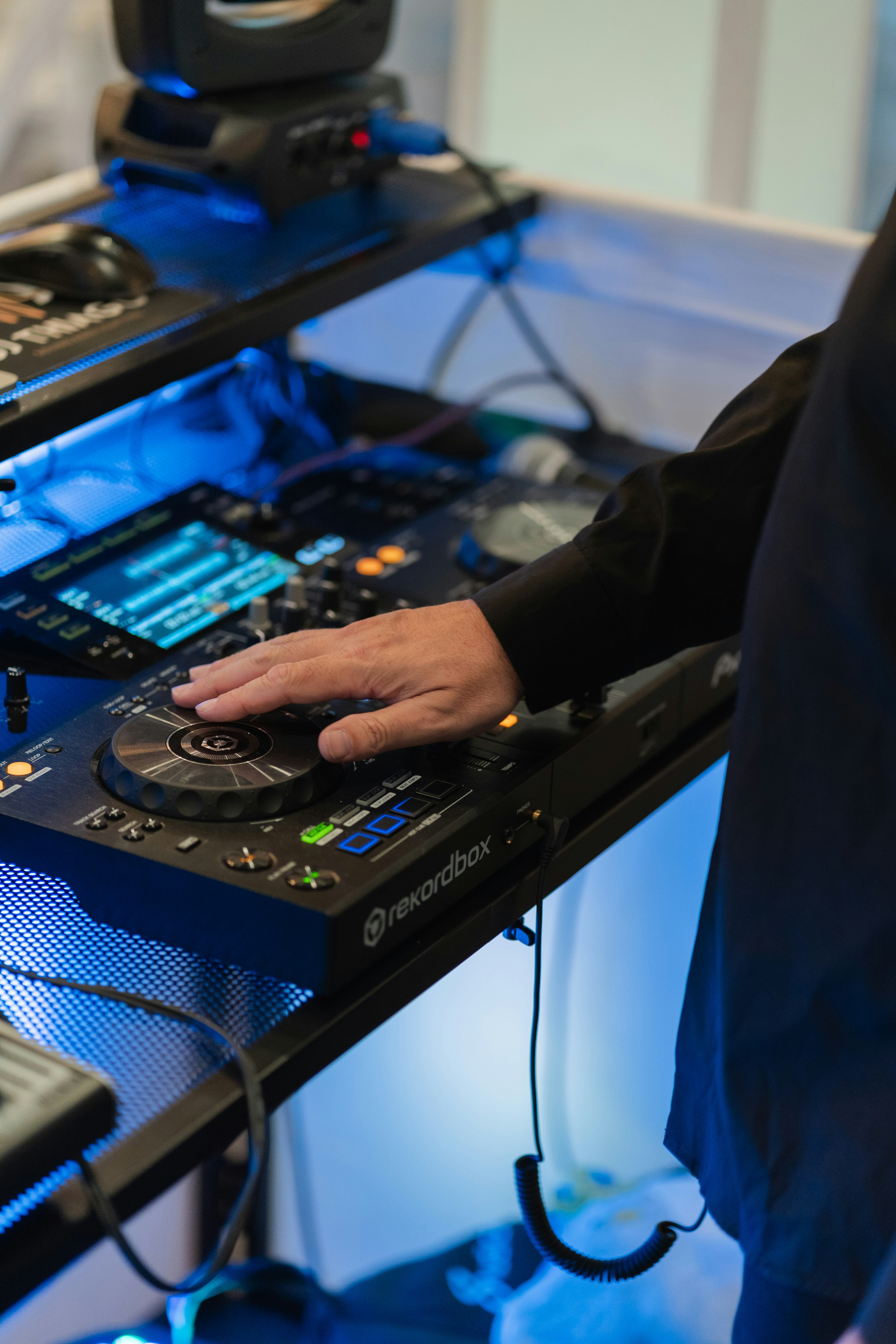 Hands on the Deck: A DJ at the Control Console