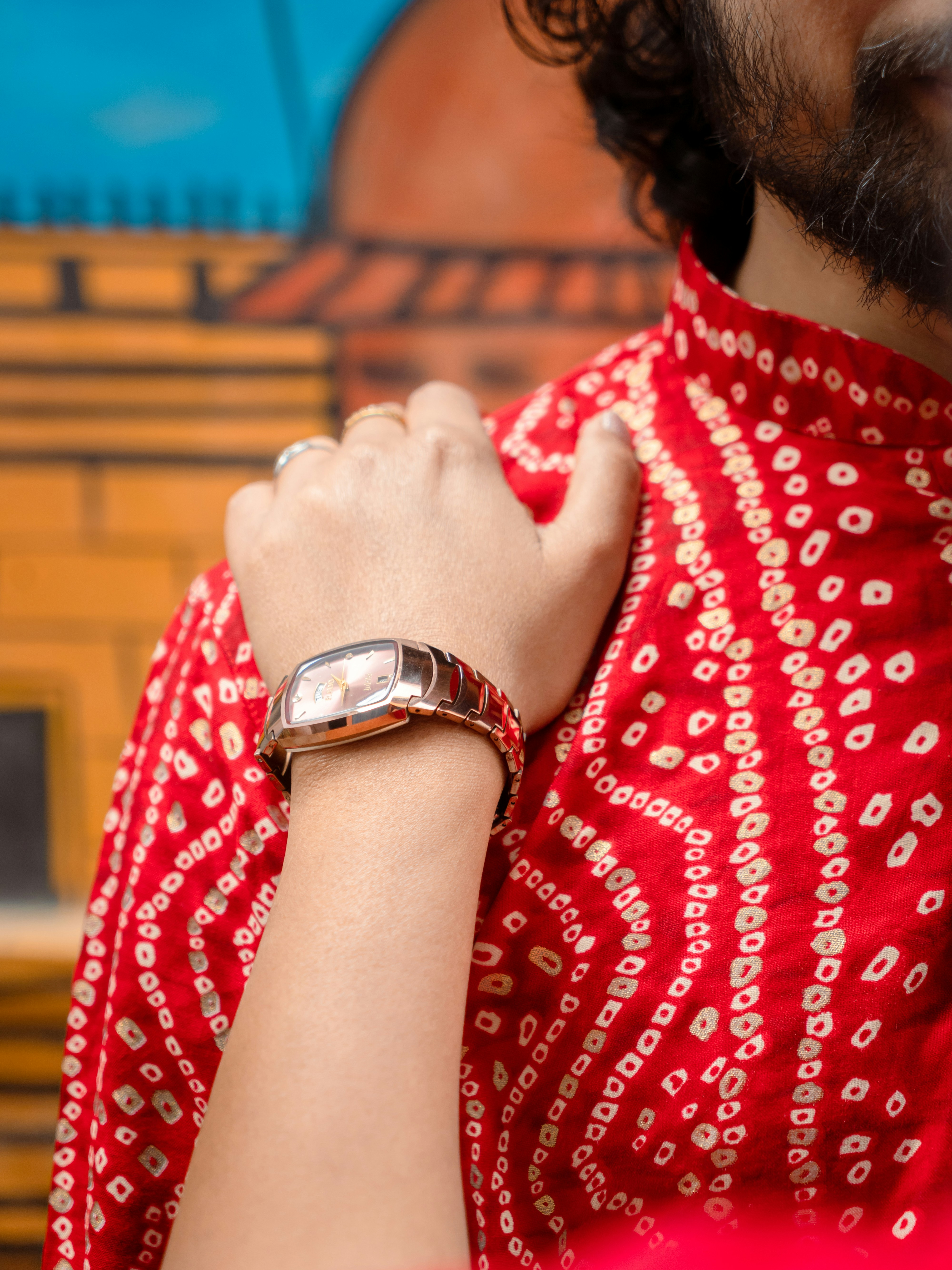 Red Bandanna, Silver Watch, and a Quiet Gaze