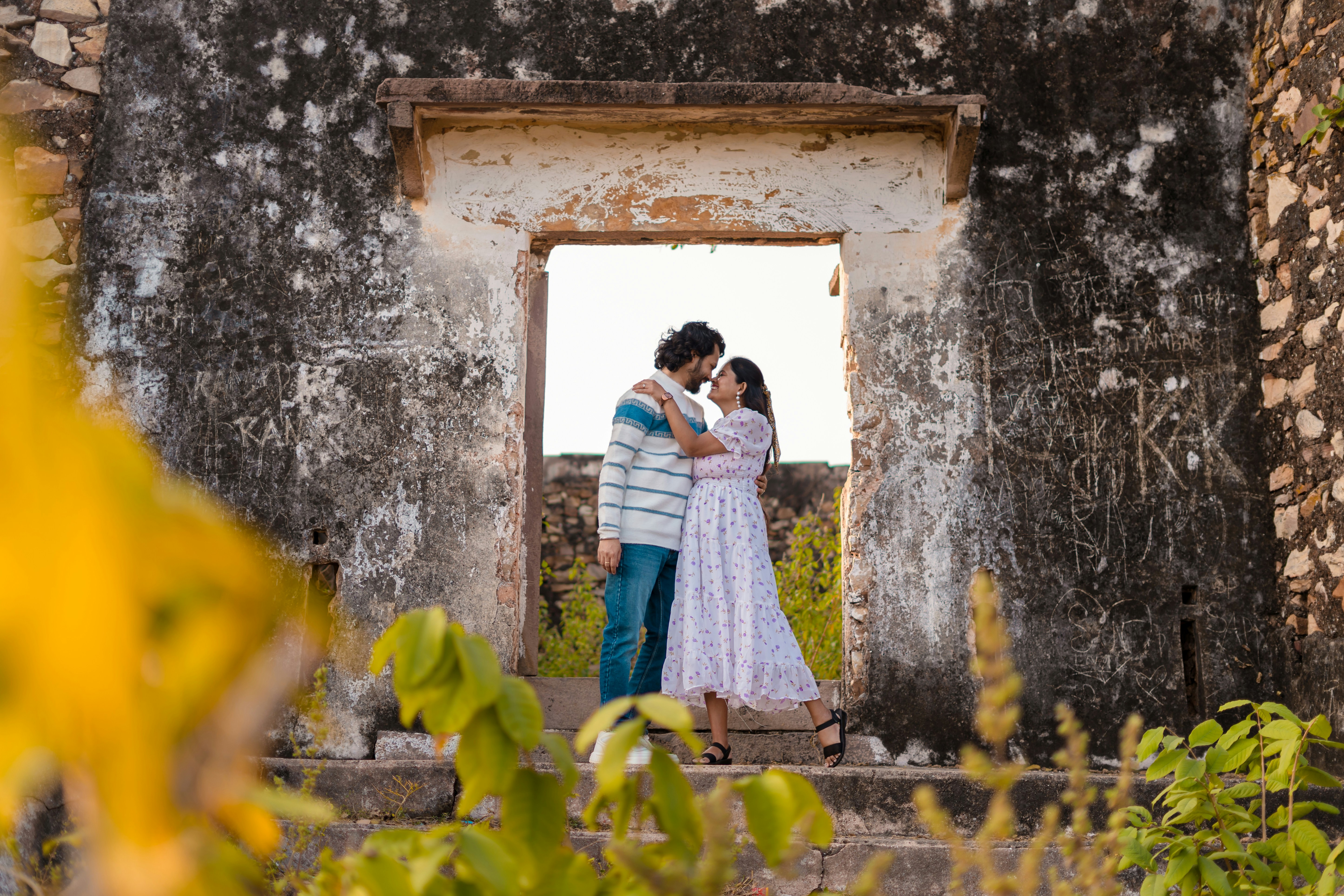 Kiss Through a Weathered Archway
