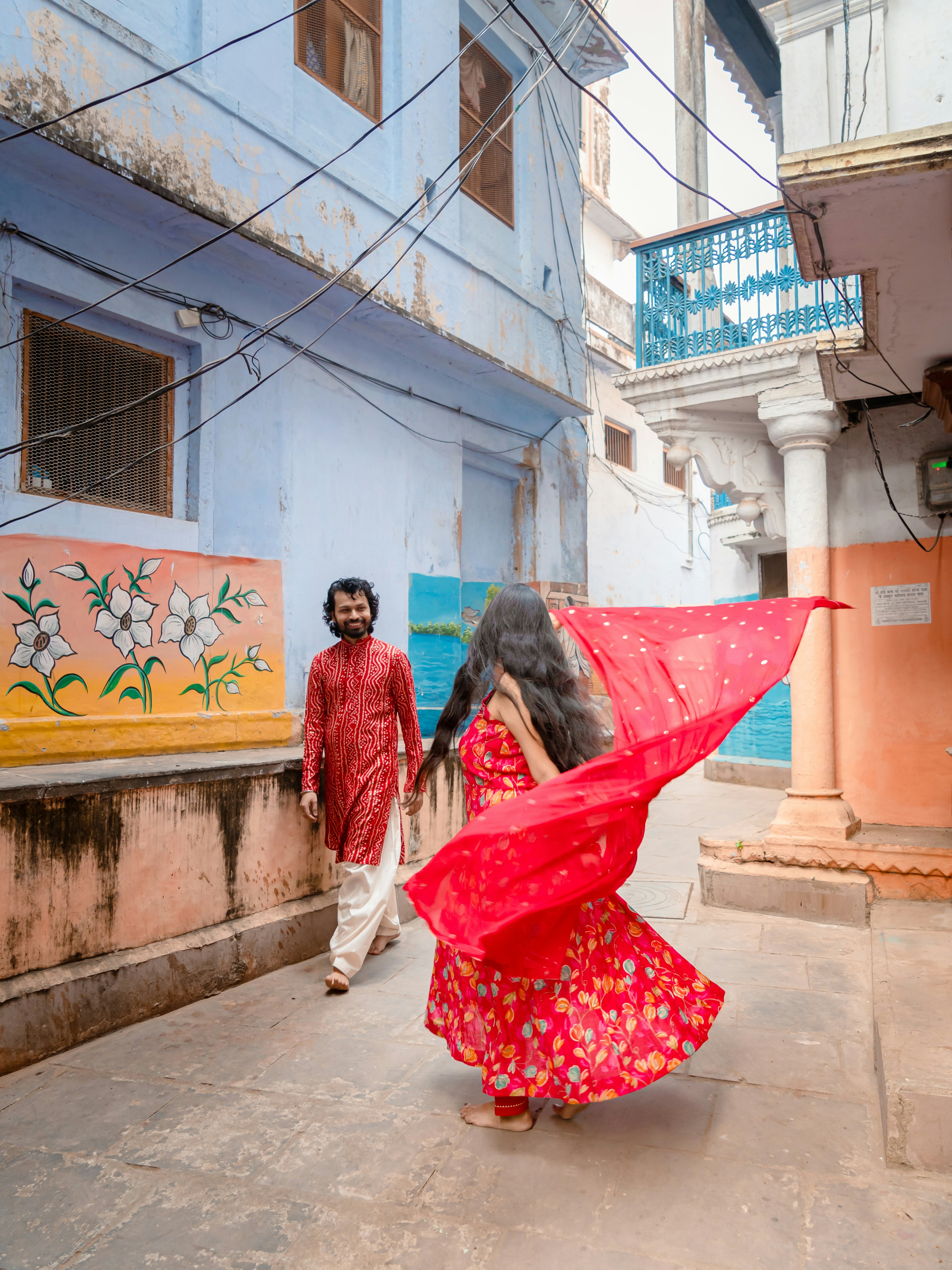 Red Saree in Motion: A Quiet Alley Dance