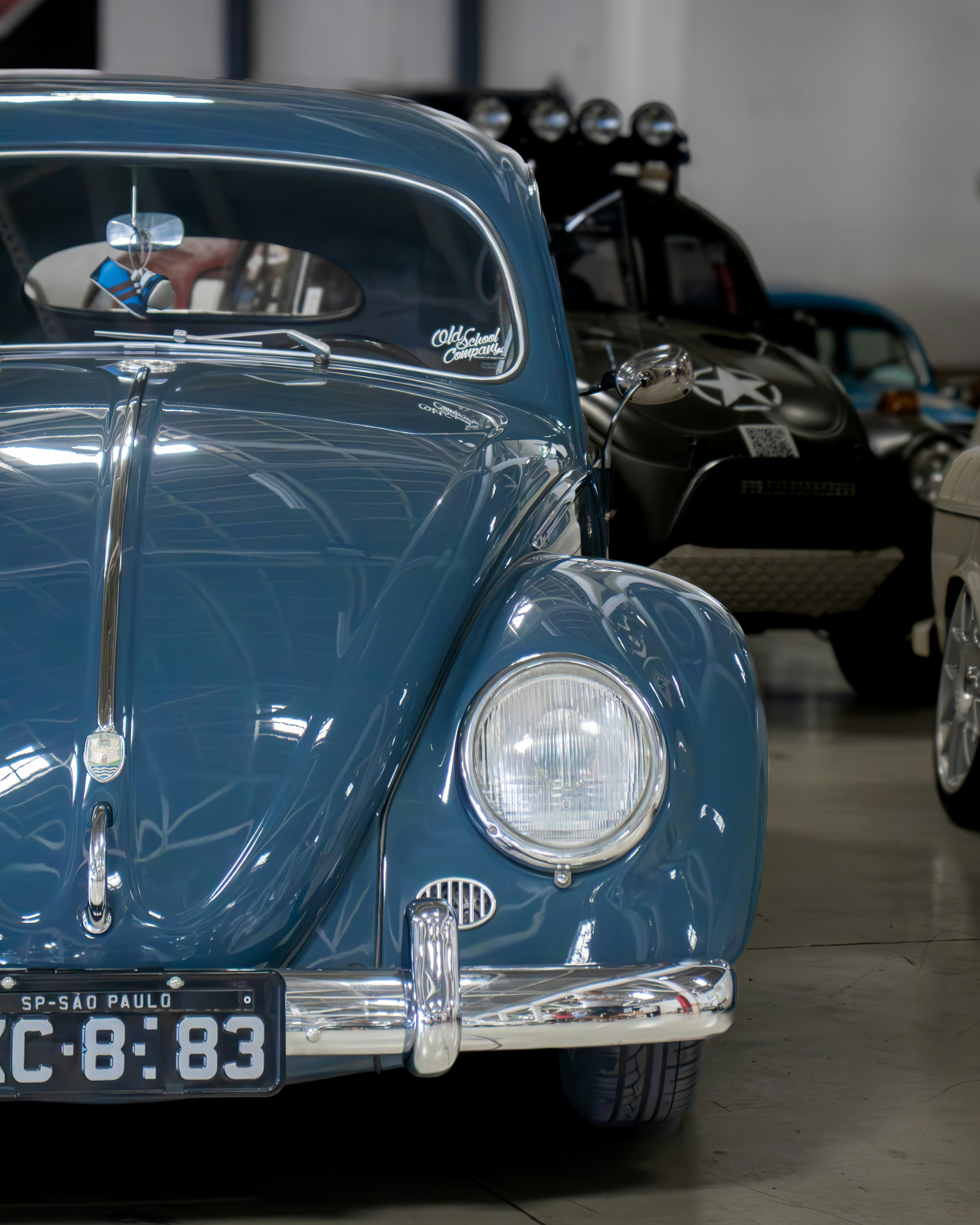 Blue Vintage Hood: A Classic Pearl in a Modern Garage