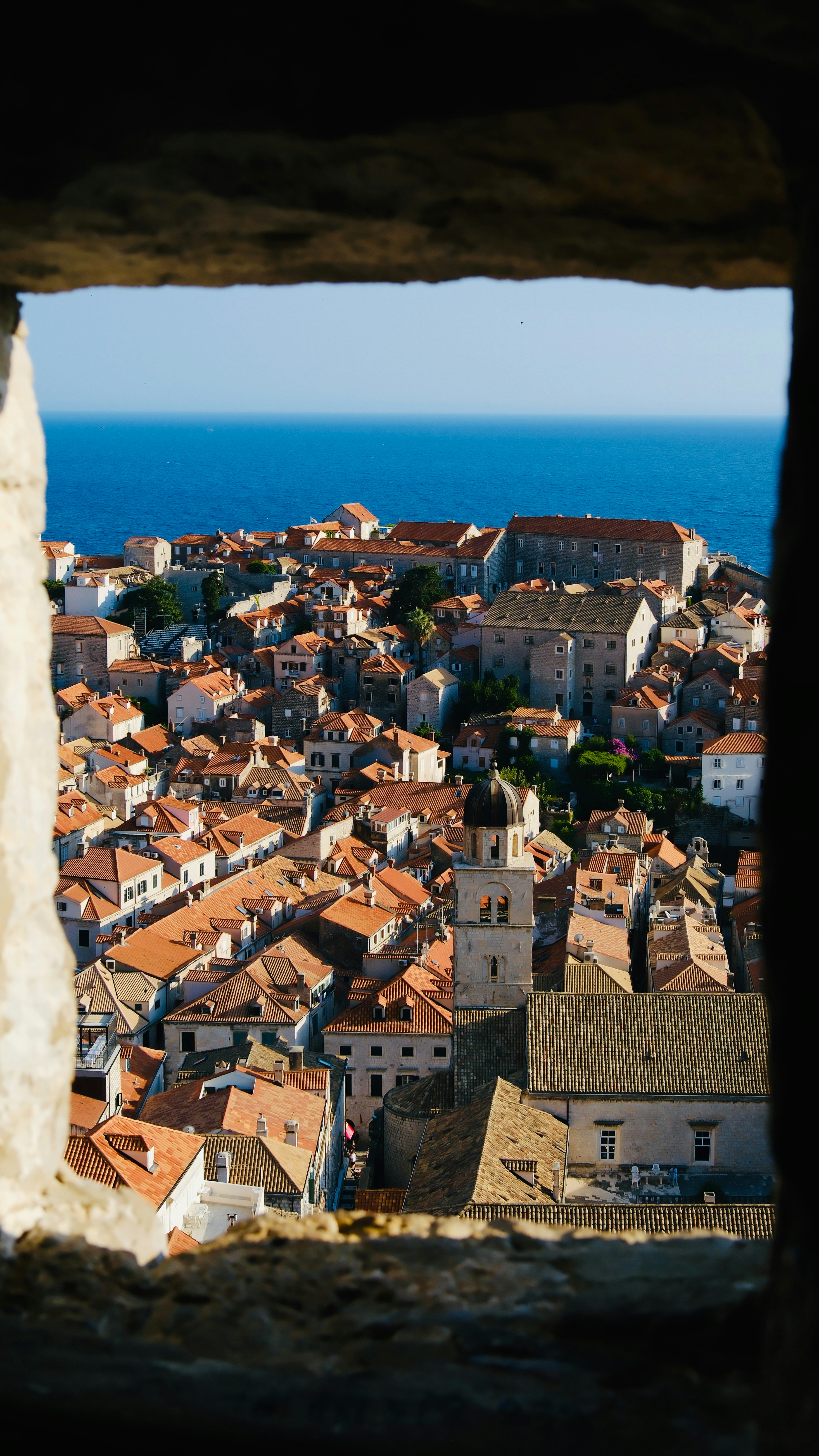 Window onto a sunlit Adriatic town