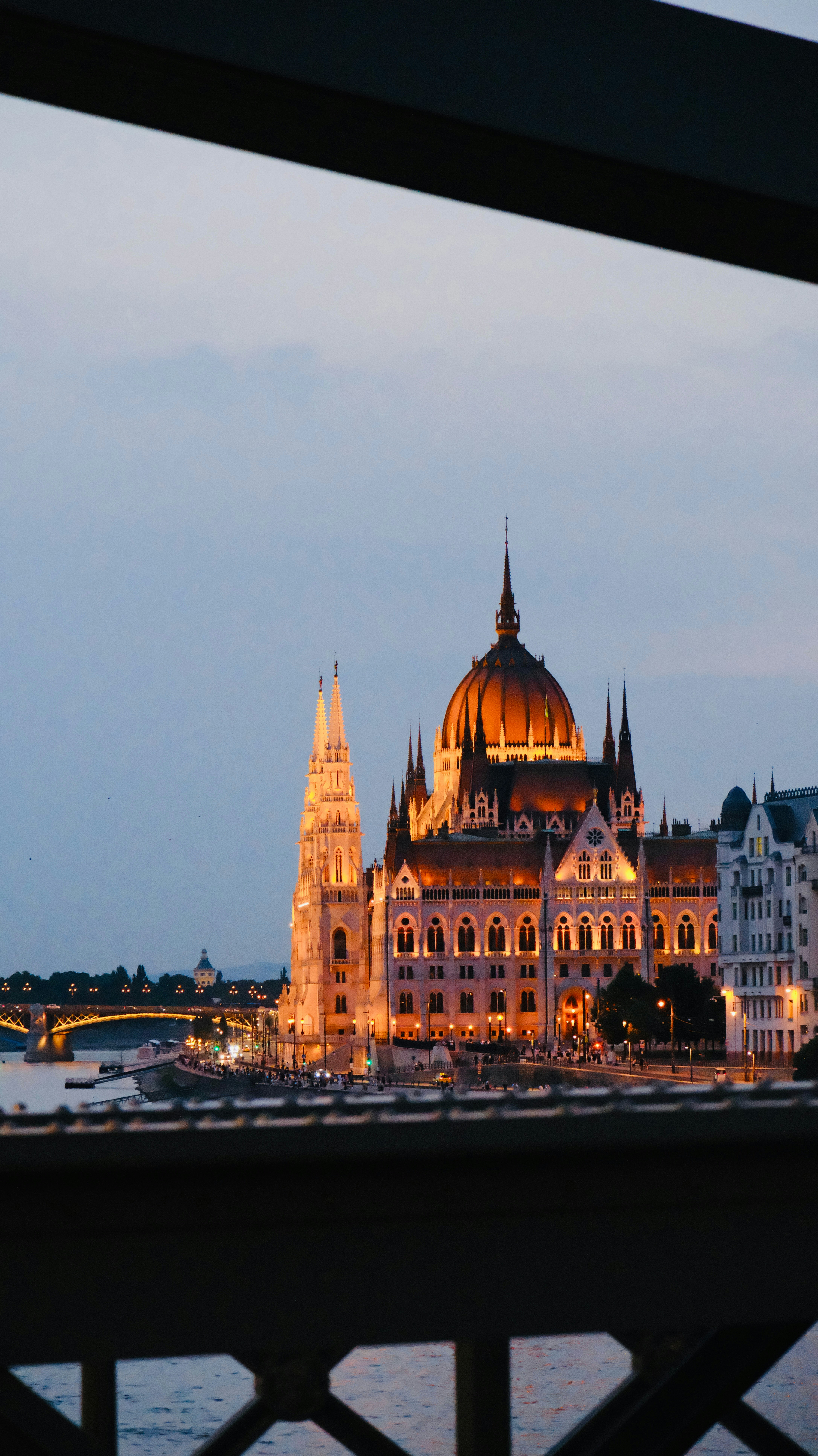 Golden Dome and Spires: Nighttime Silhouette Over the Danube
