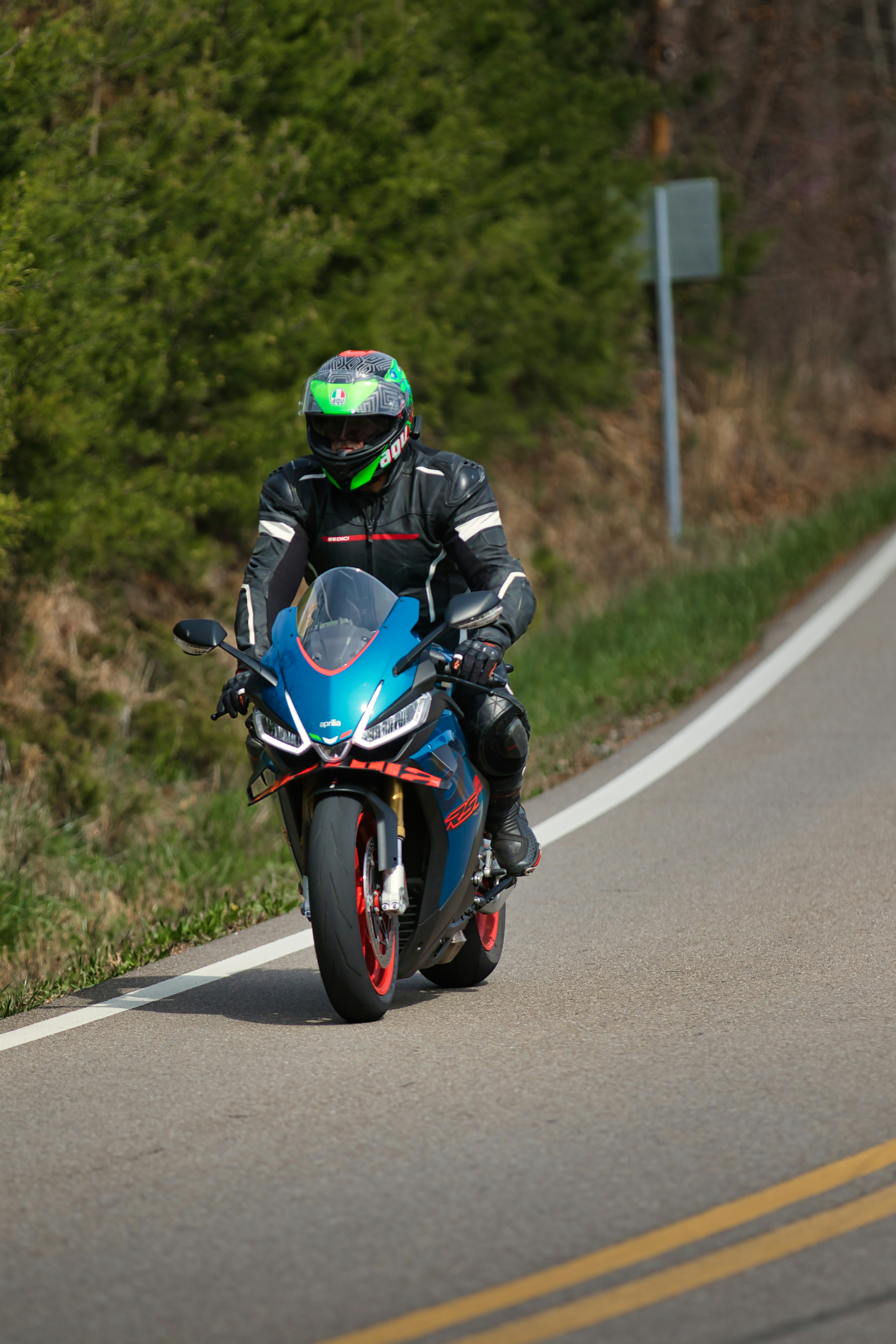 Neon-Helmet Rider Confronts the Open Road