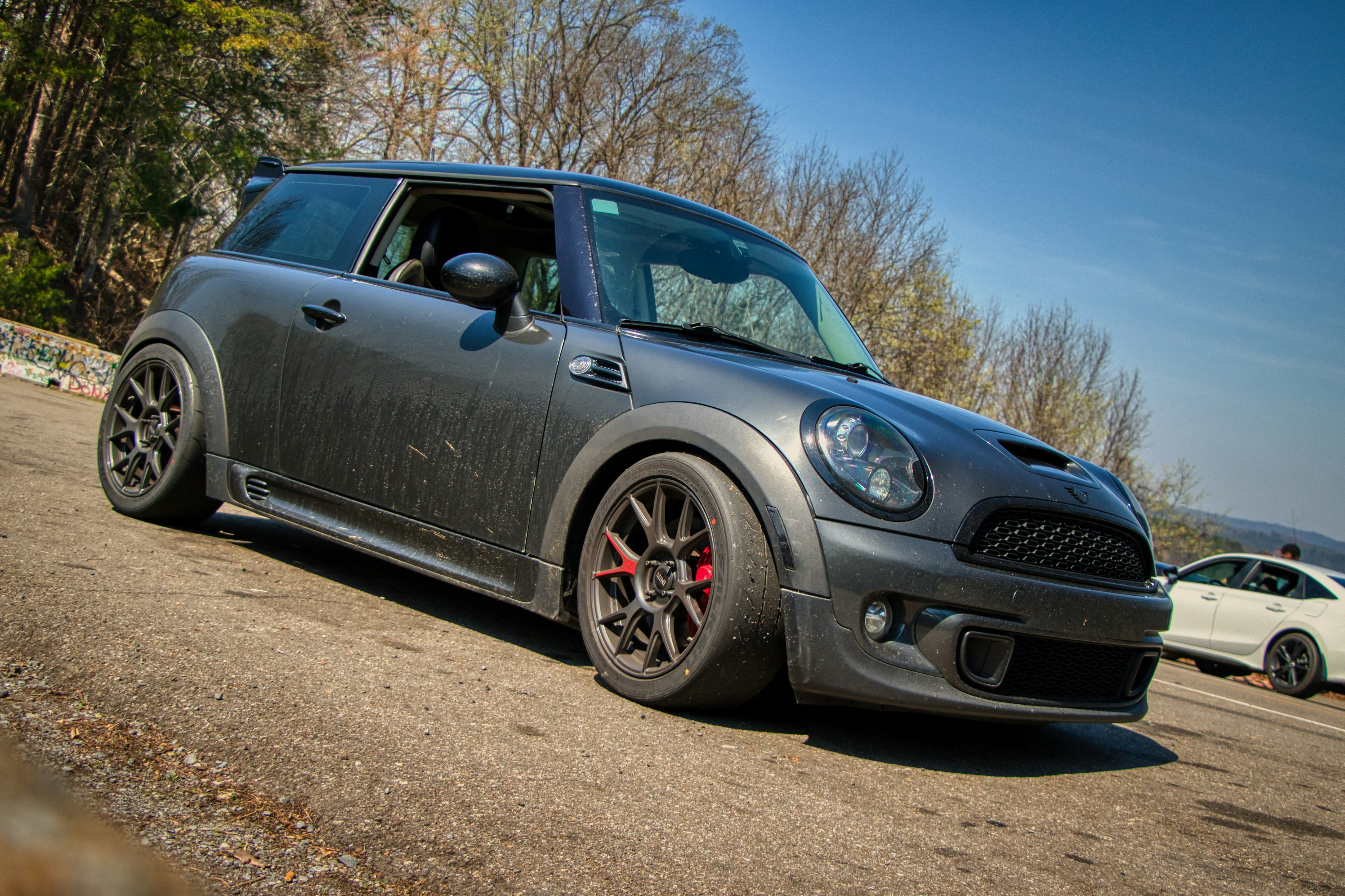 Mud-Splattered Mini Cooper S Roars in a Quiet Lot