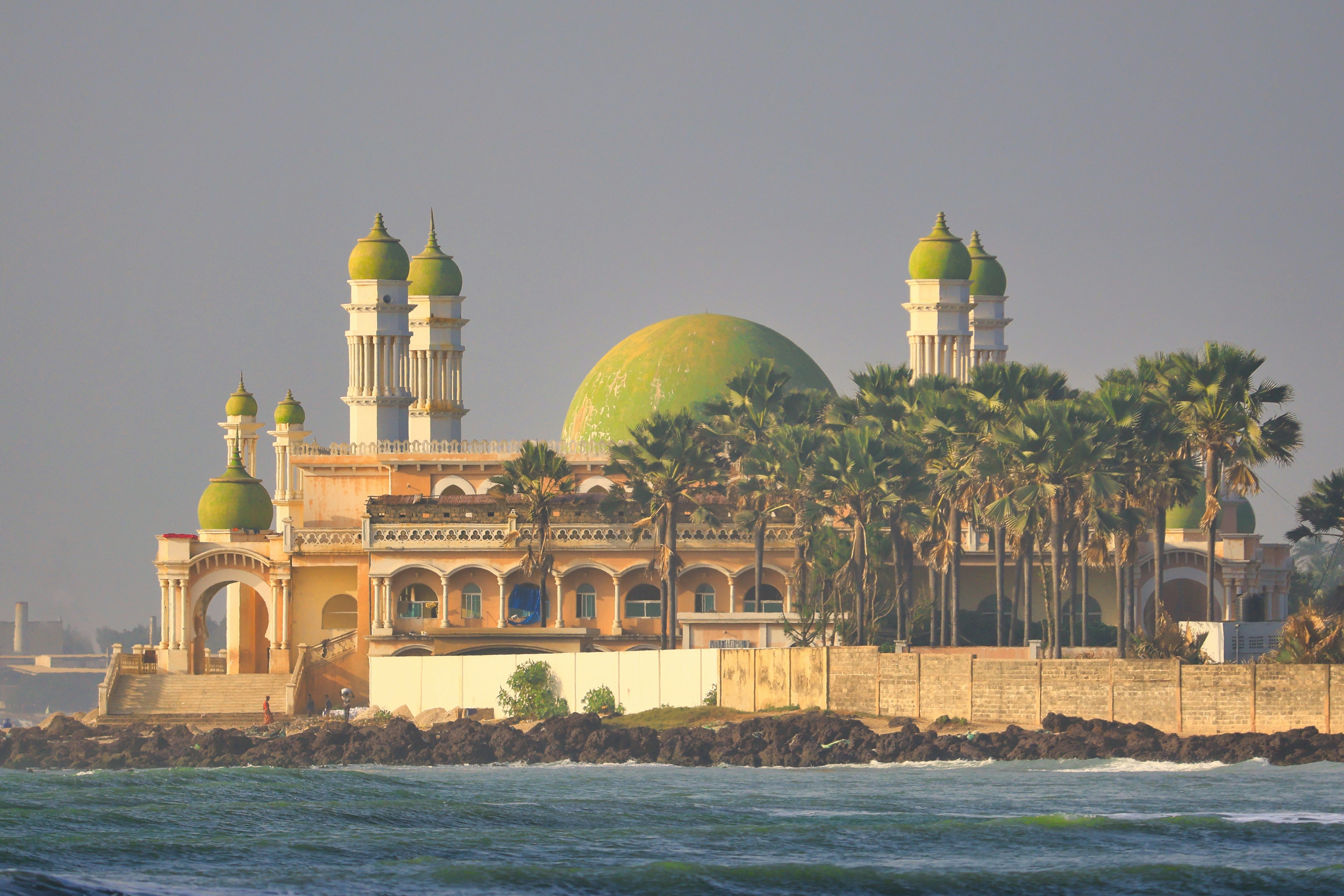 Coastal Crest: A Moorish-inspired villa rising from palm-fringed rocks