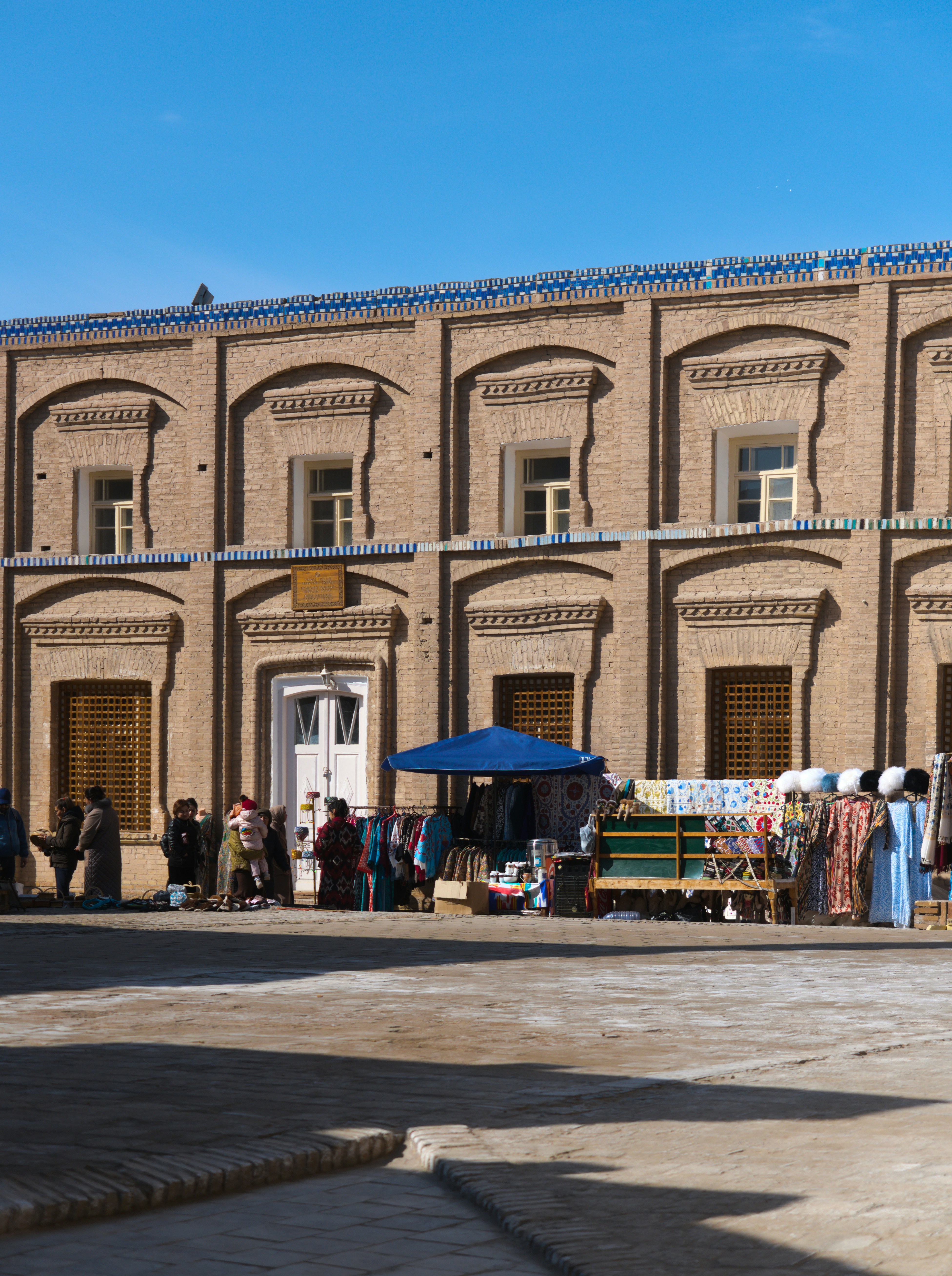 Courtyard Market beneath Arched Facades