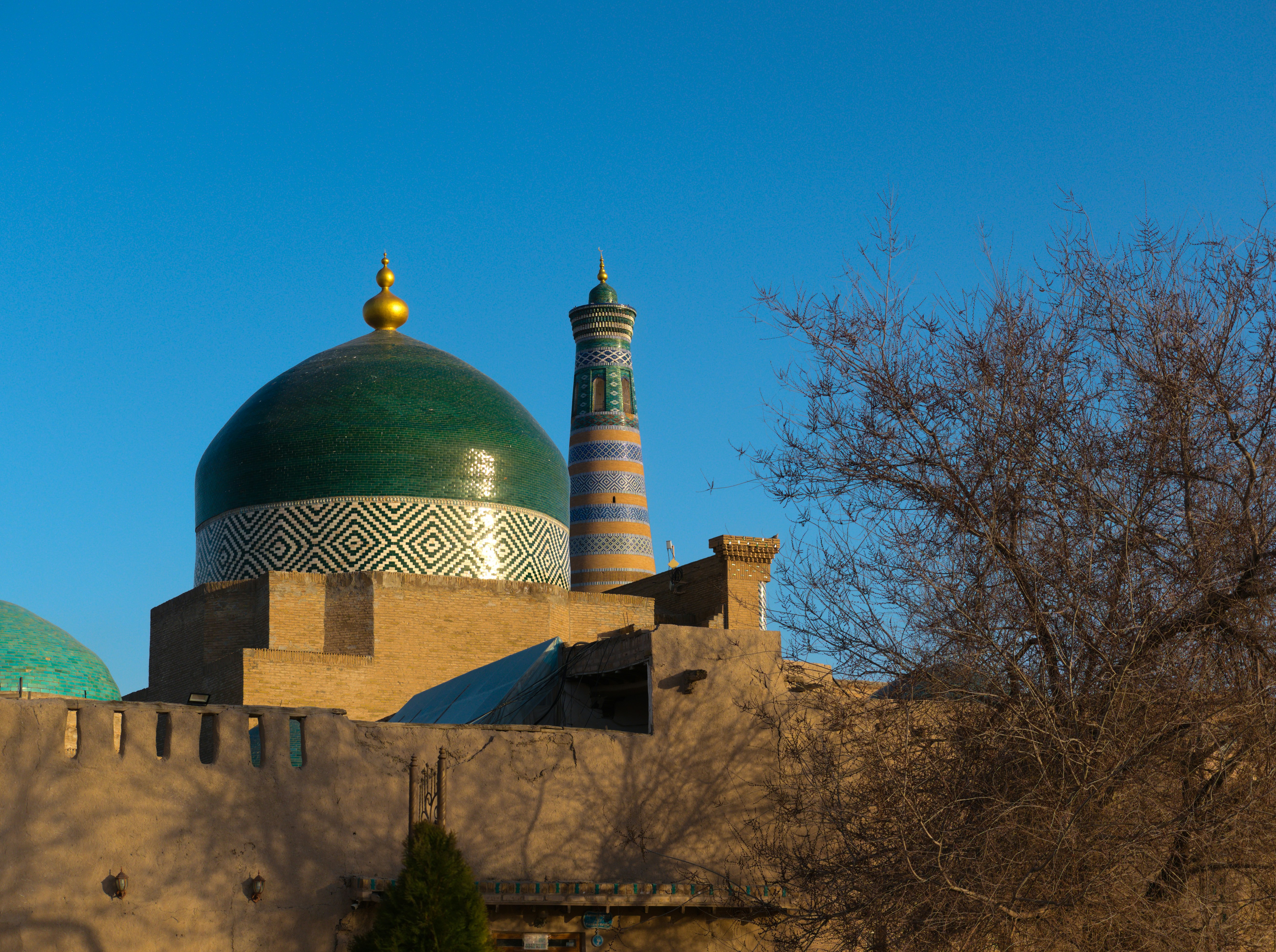 Blue Dome and Minaret Over the Earthen Citadel