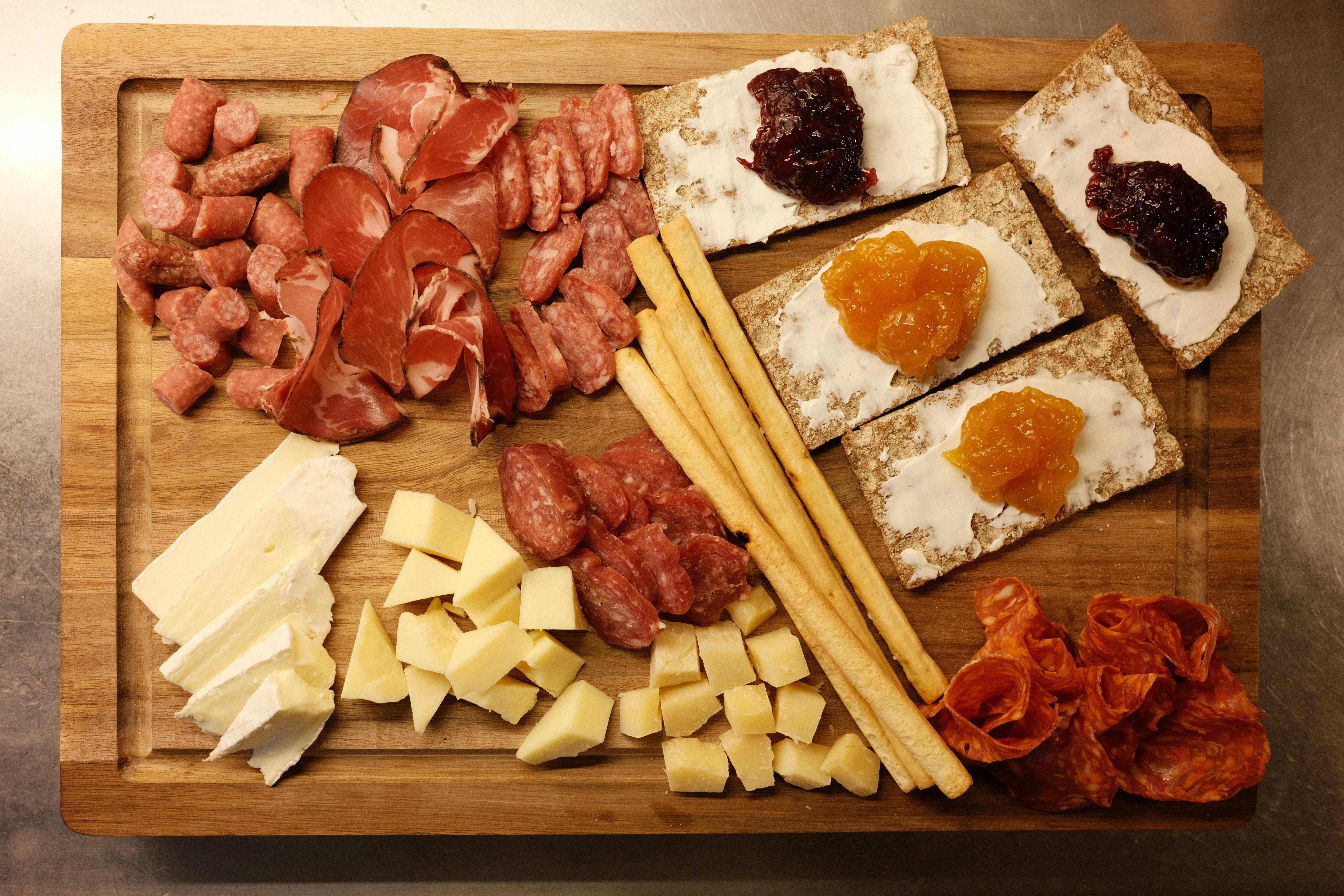 A Rustic Board of European Charcuterie and Crackers