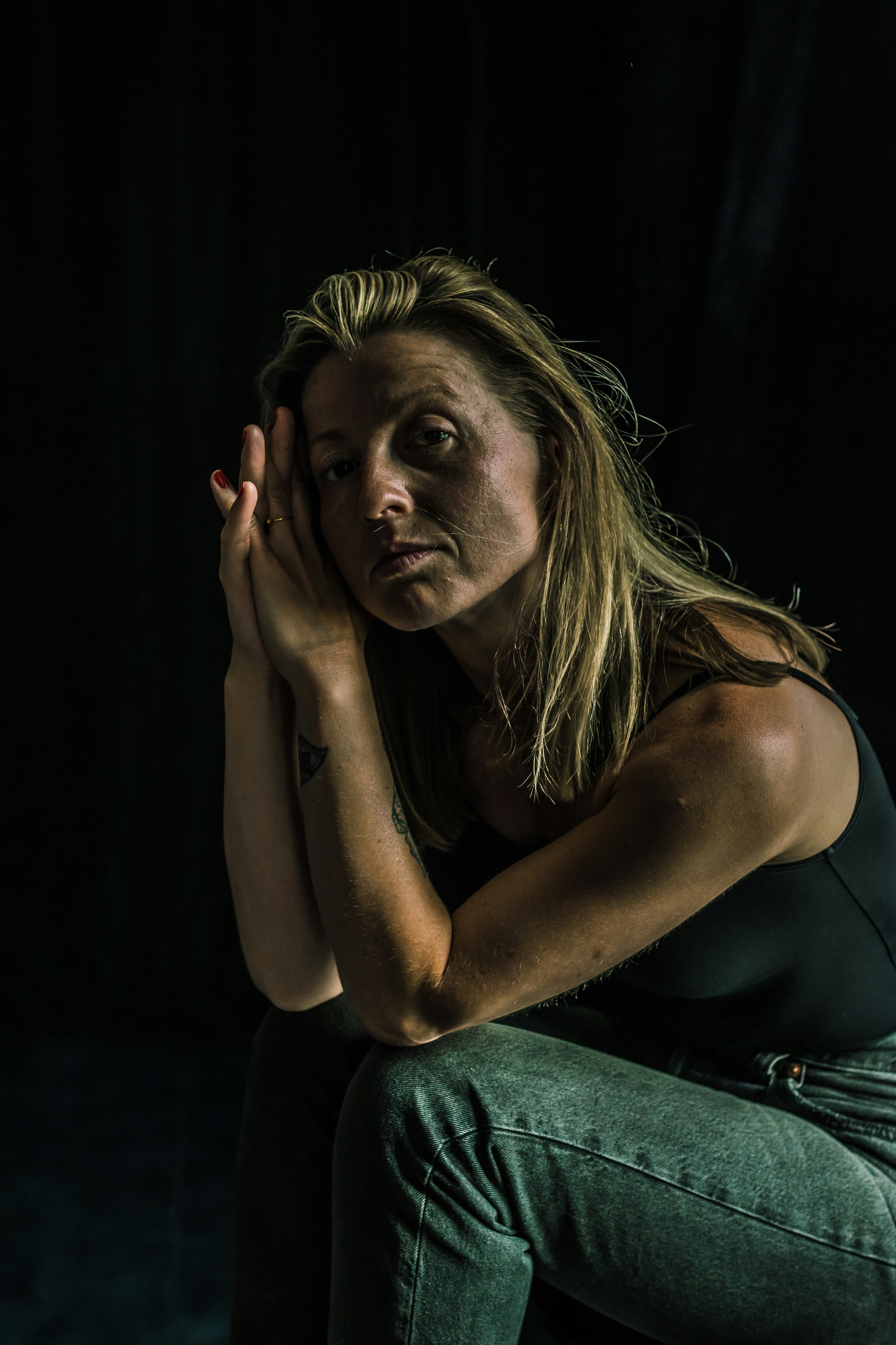 Quiet Introspection: A Portrait in Shadow and Steel