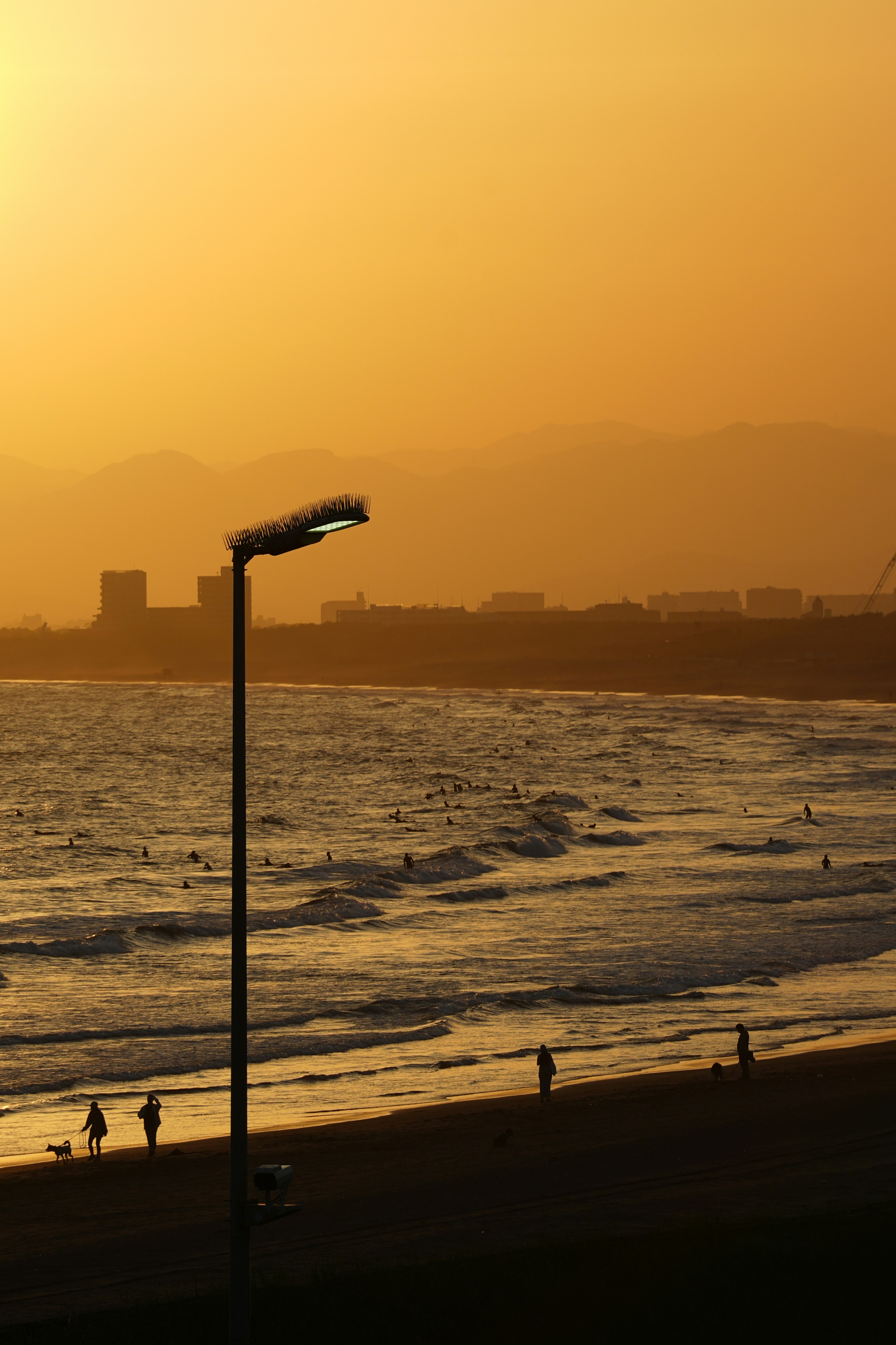 Golden Hour Sentinel: The Shoreline Lamp Eras in Quiet Dusk