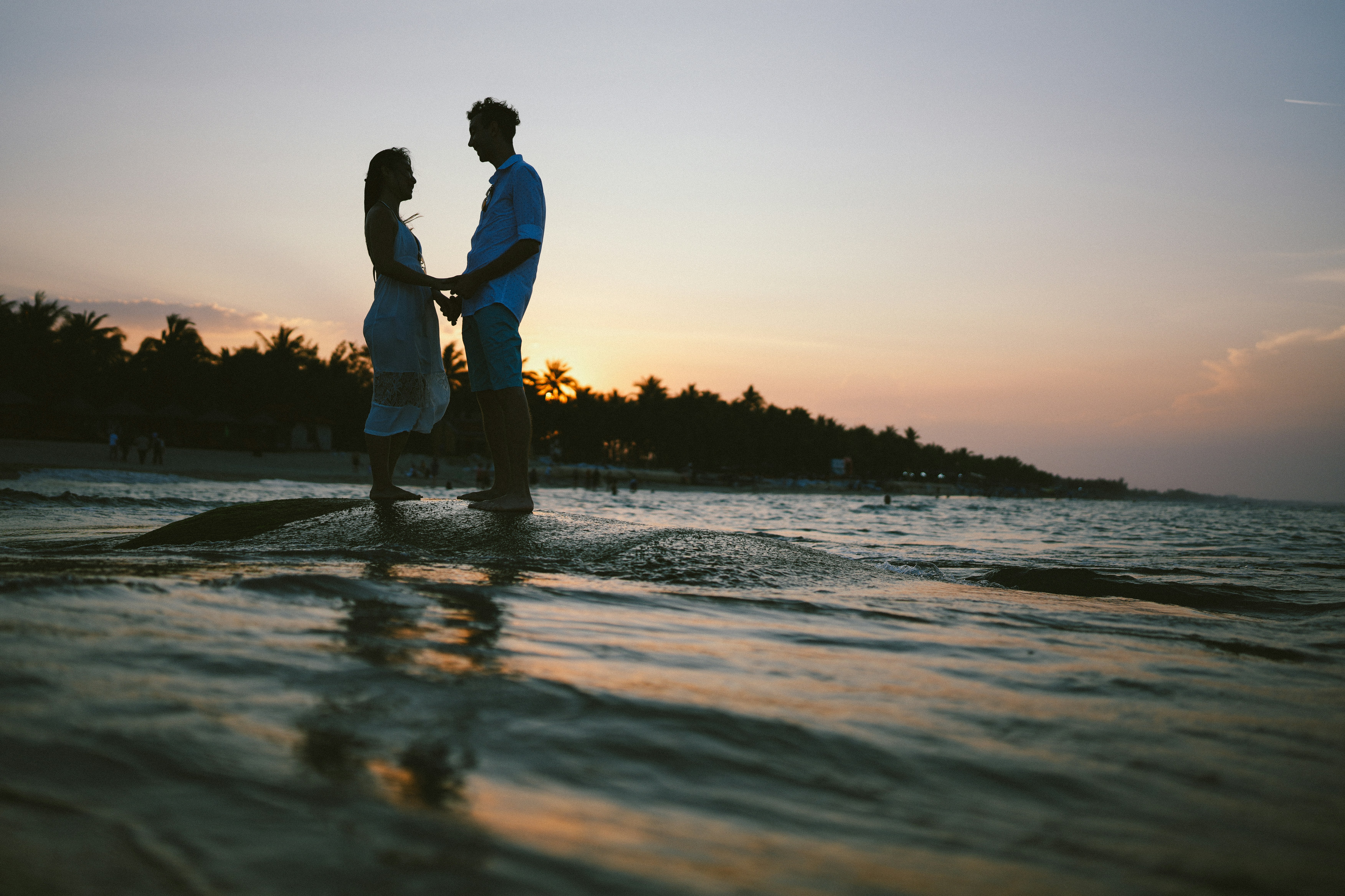 Twilight vows on a calm shoreline
