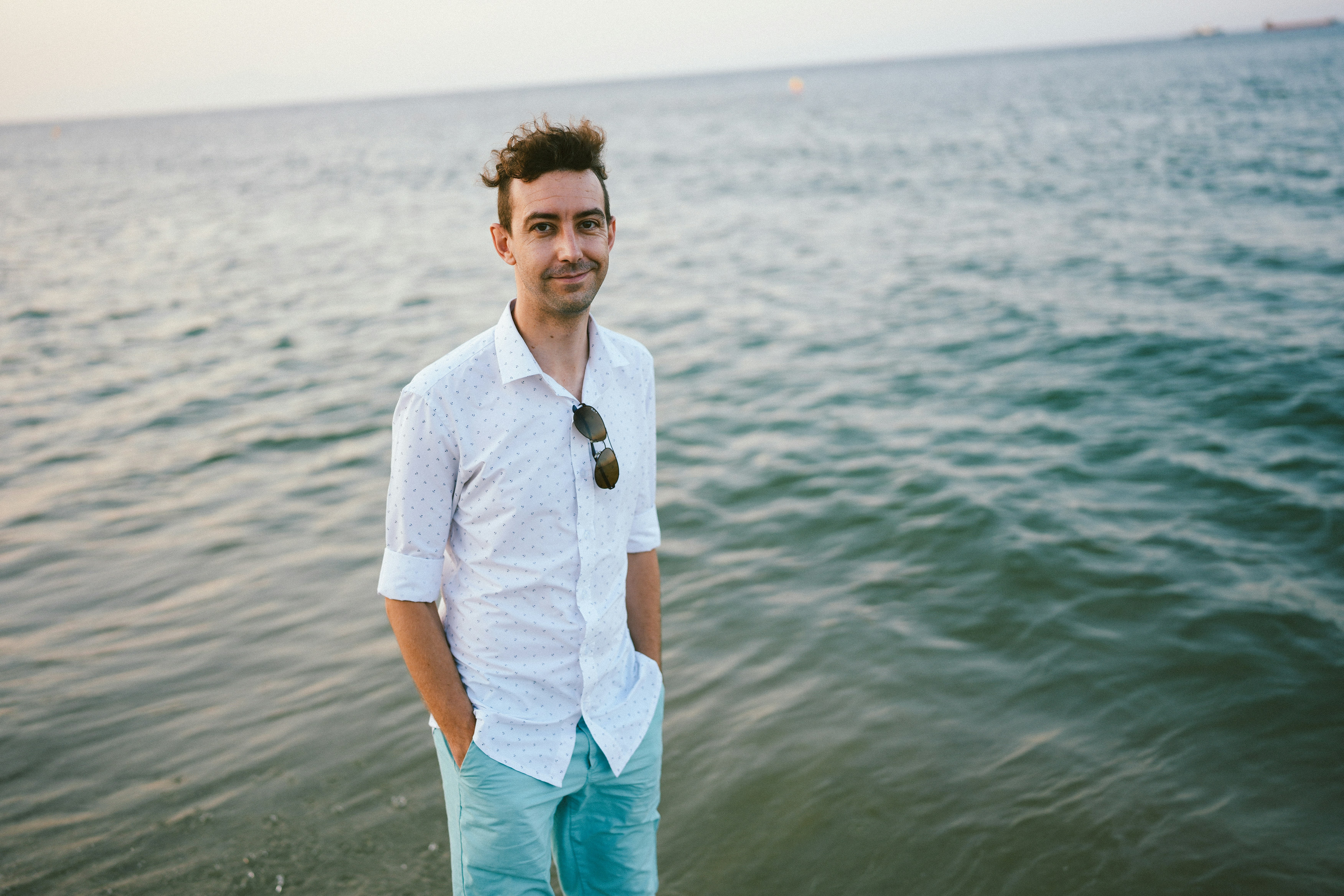 Coastal Confidence: A Portrait at Dusk by the Sea