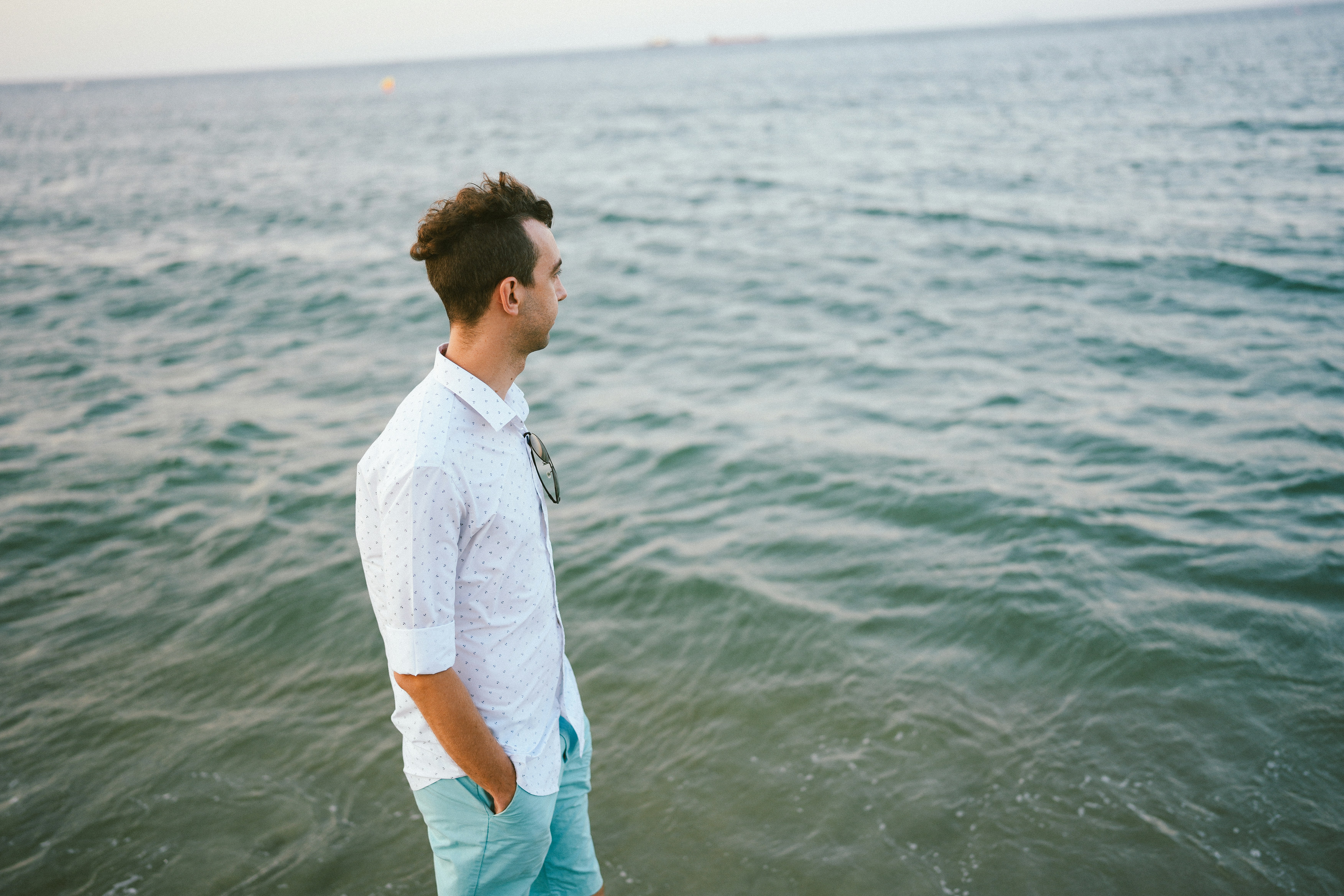 Coastal Stroll: Portrait of a Man by the Sea