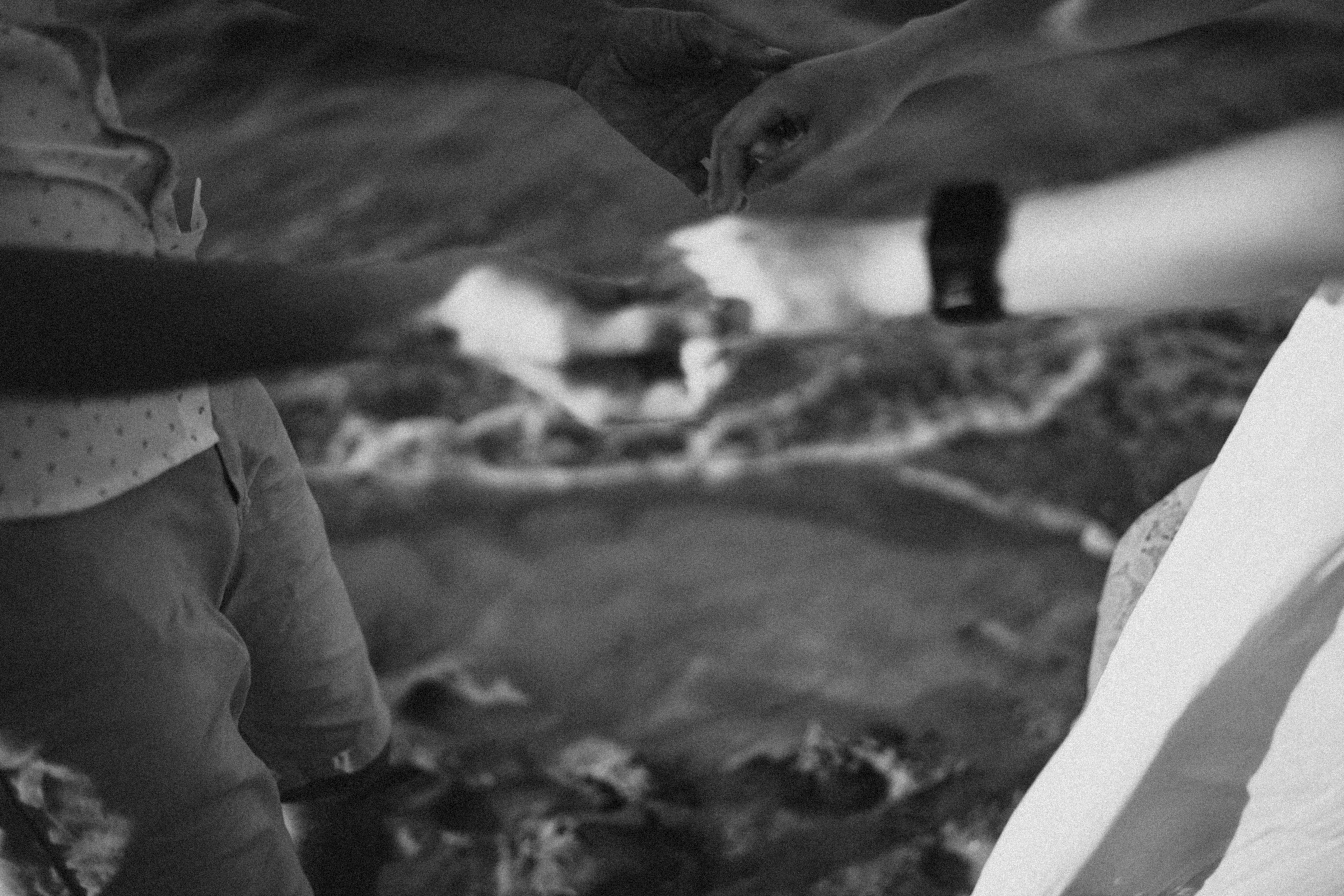 Hands in Motion: A Moment of Shared Connection on the Sand