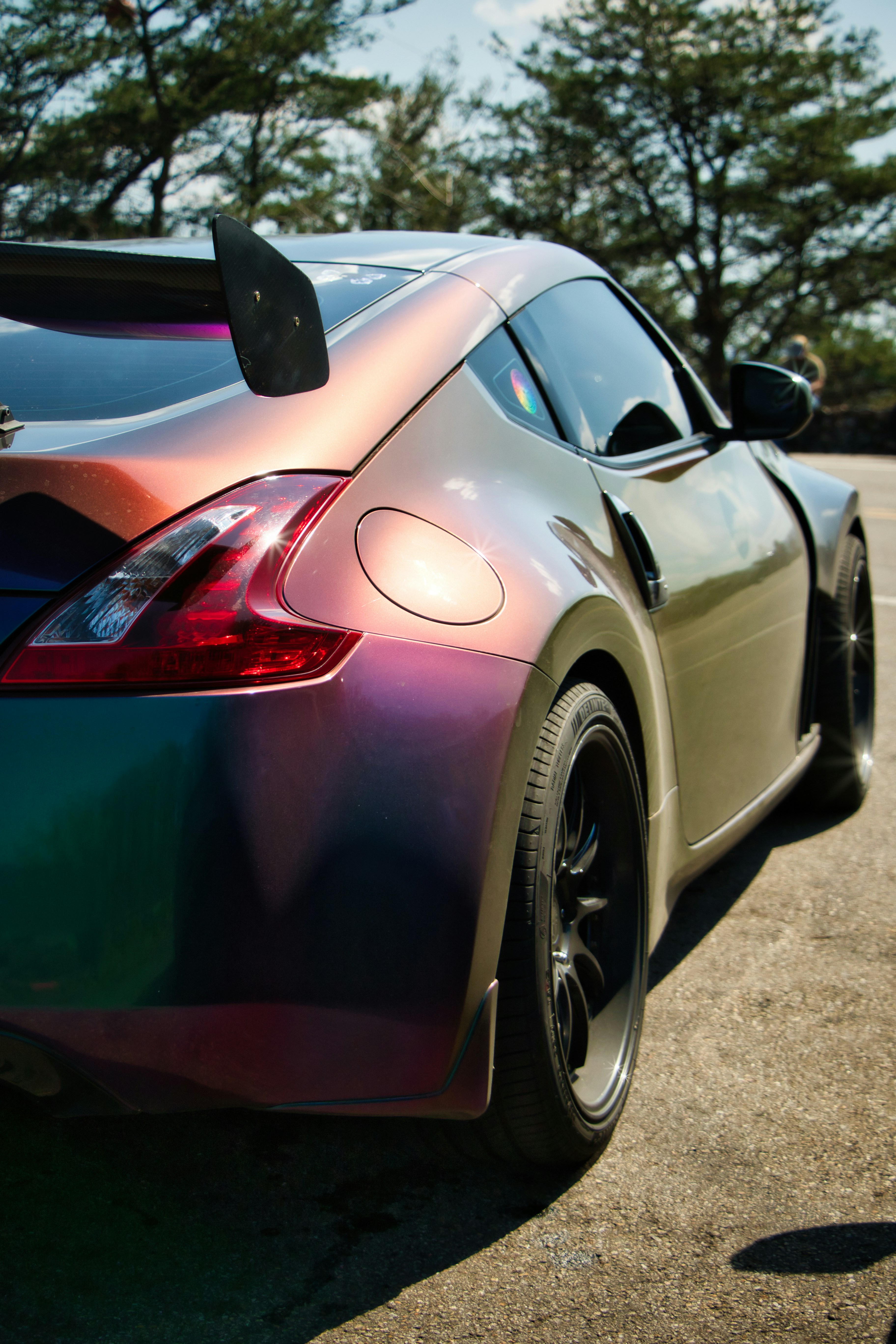 Iridescent Curves: A Sportscar at Sunset
