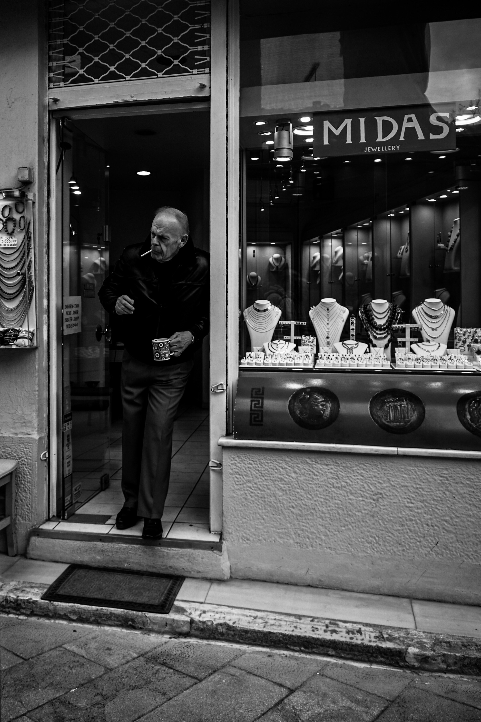 Steam and Shine: A Quiet Moment at the Jewelry Shop Threshold