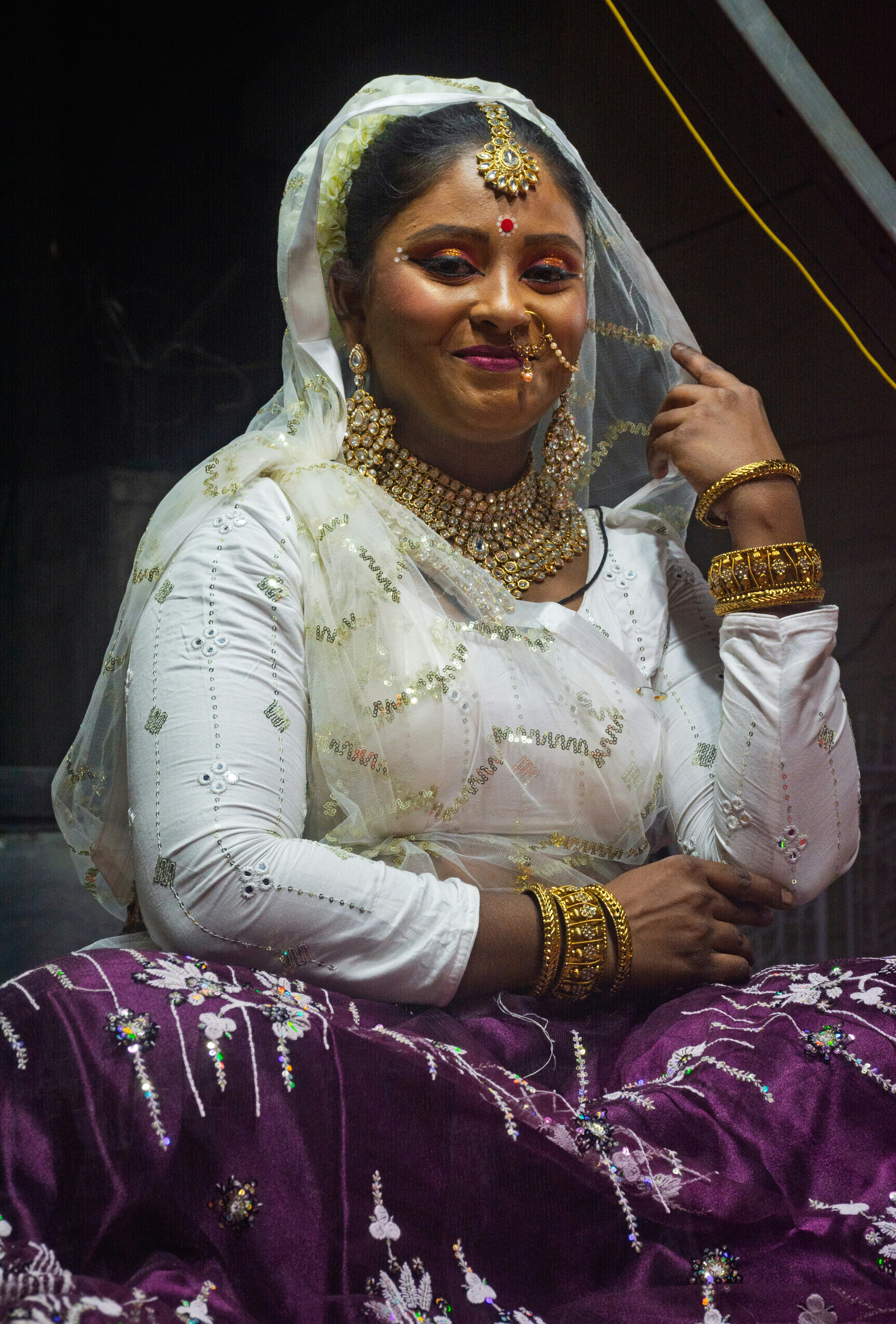Golden Grace: Bride in White Draped in Opulence