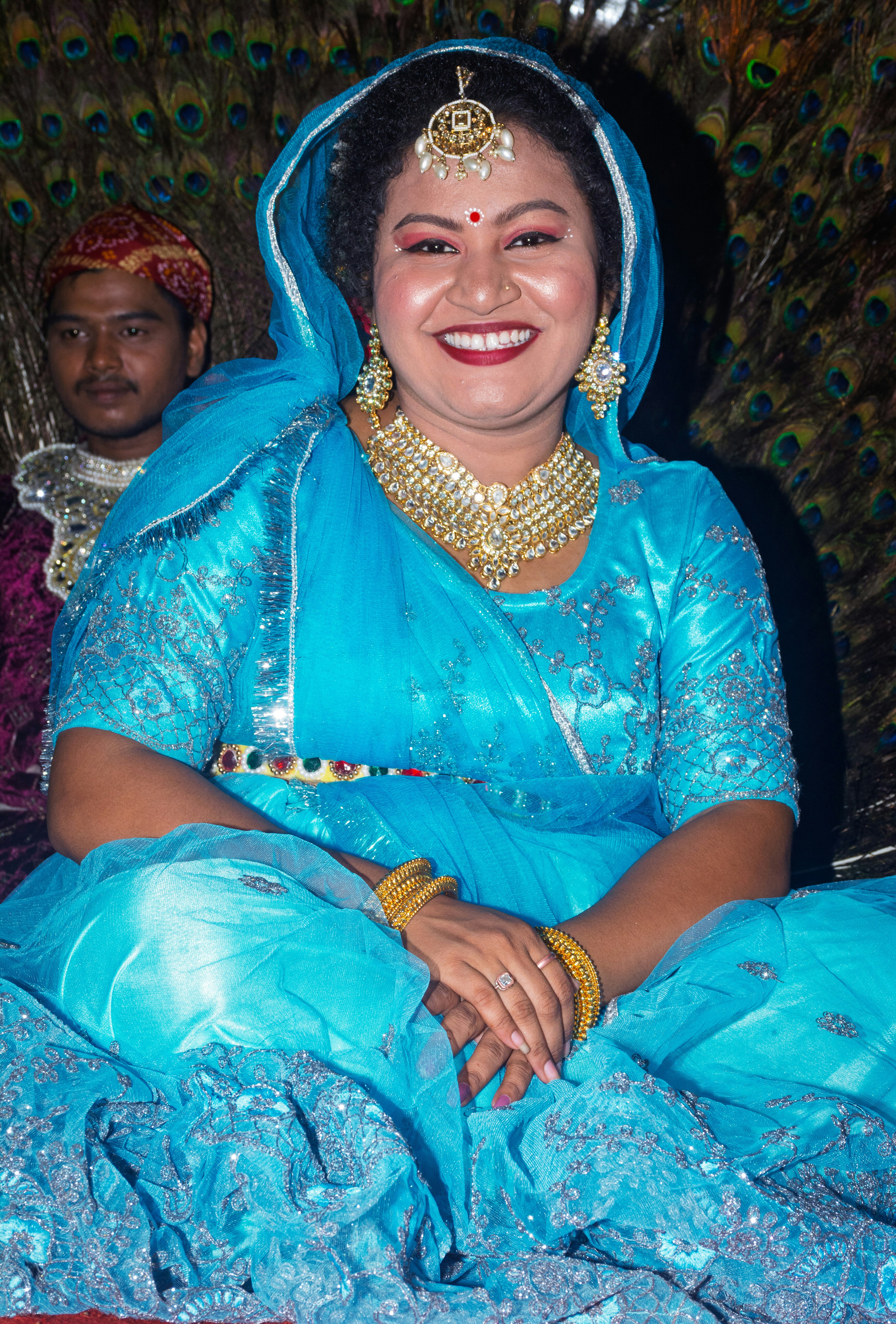 Bright Turquoise Poser: A festive portrait in regal blue