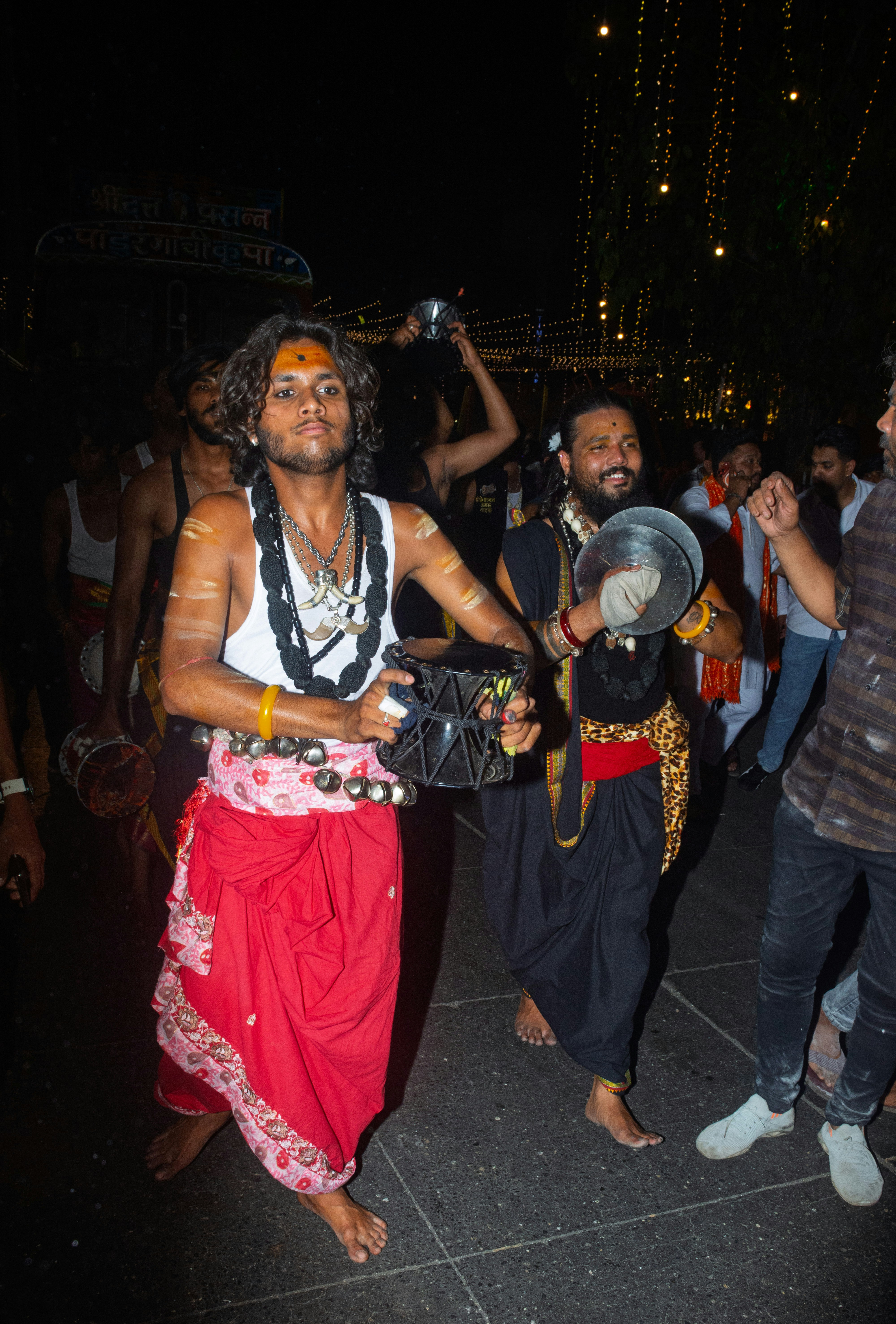 Dancing in the Night: A Kalasha Parade Under Festive Lights