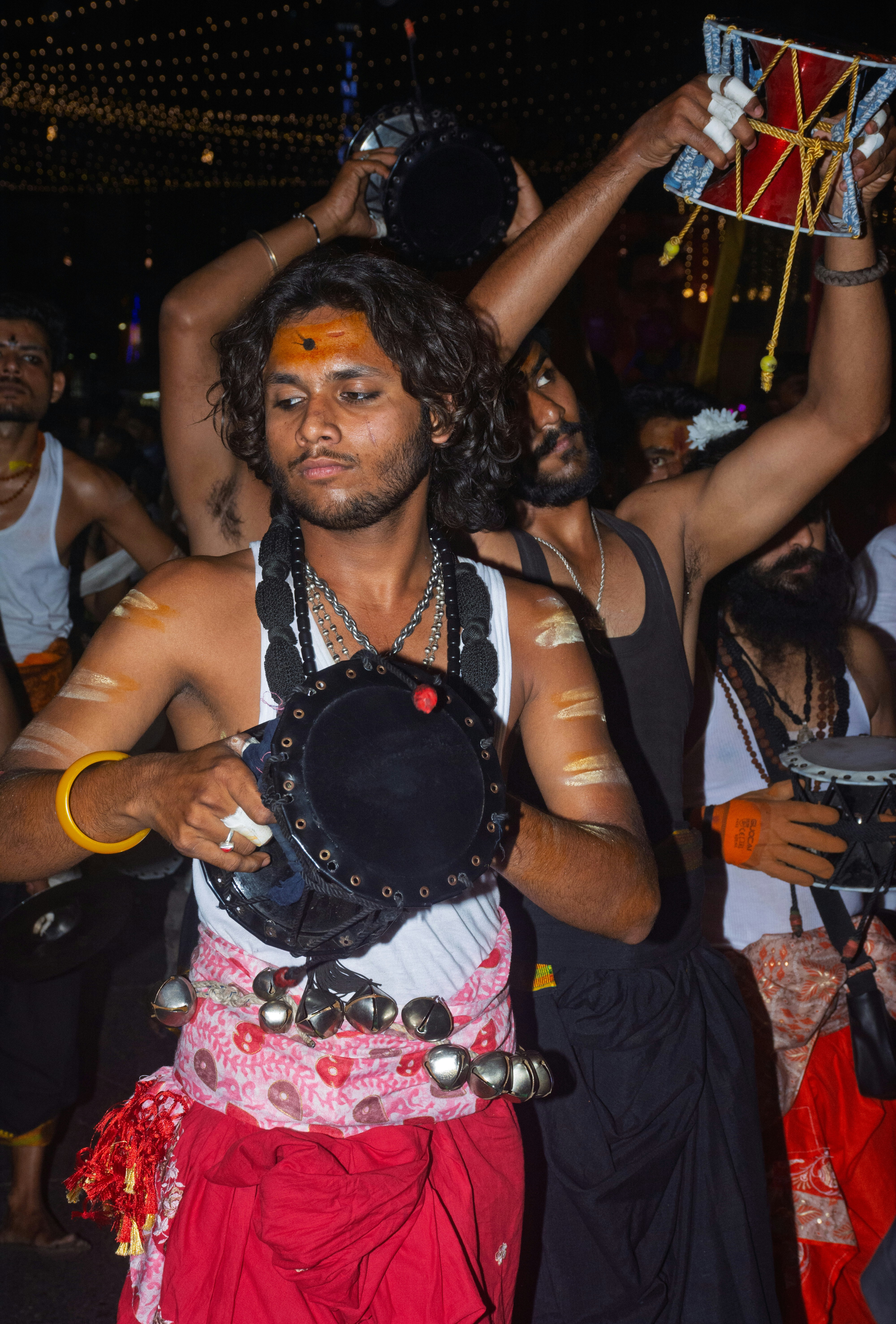 Drumbeat Under Festival Lights: The Dancer Leads the Rhythm