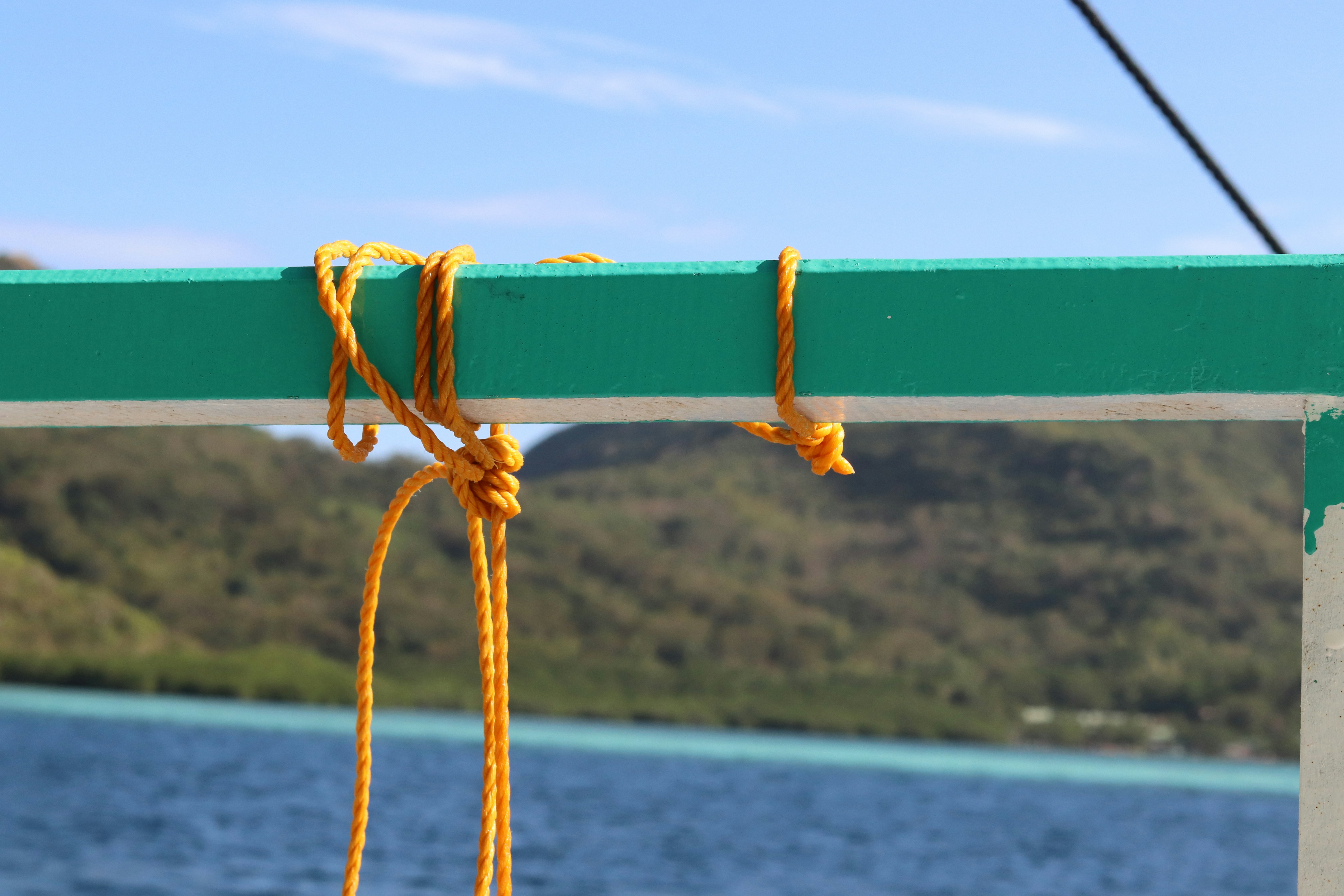 Rope Framing Over a Sunlit Sea