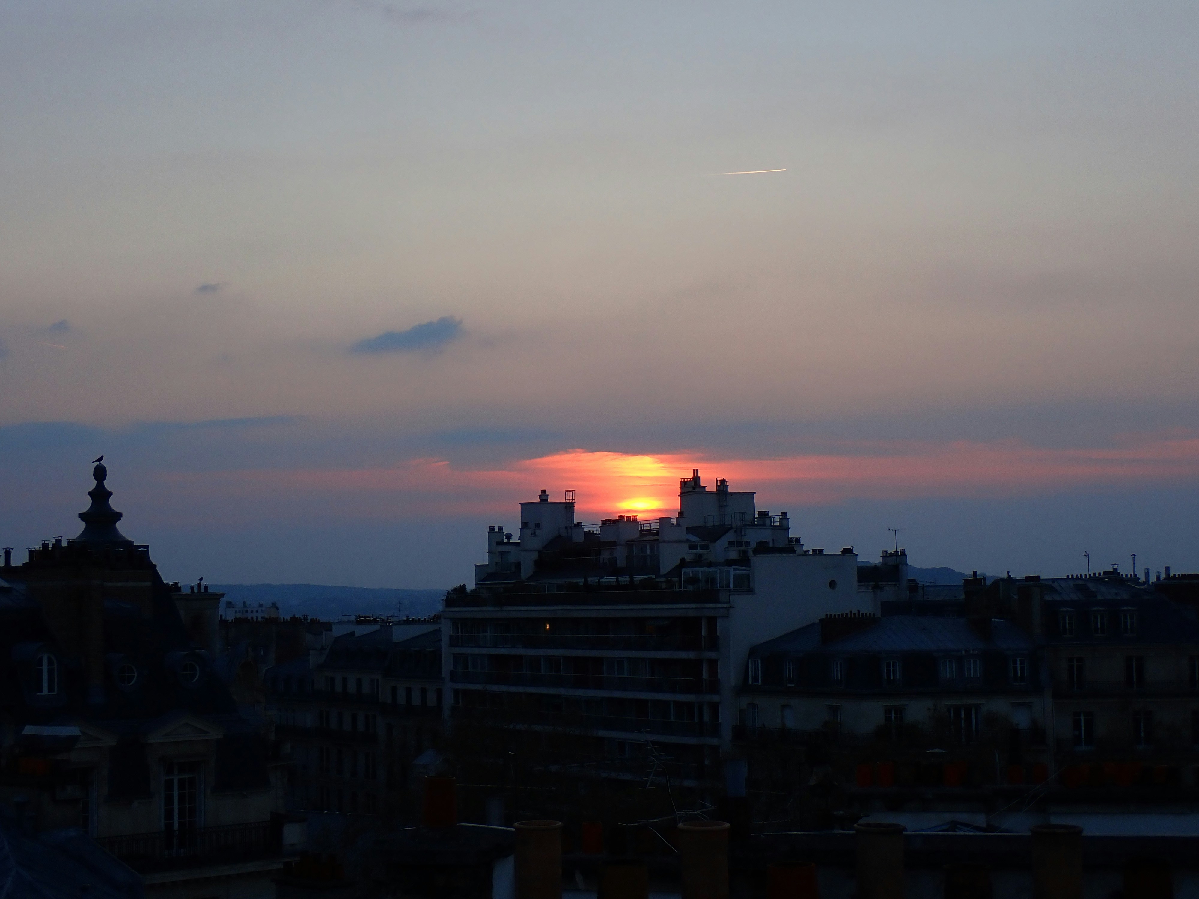 Sunset Behind a City Silhouette