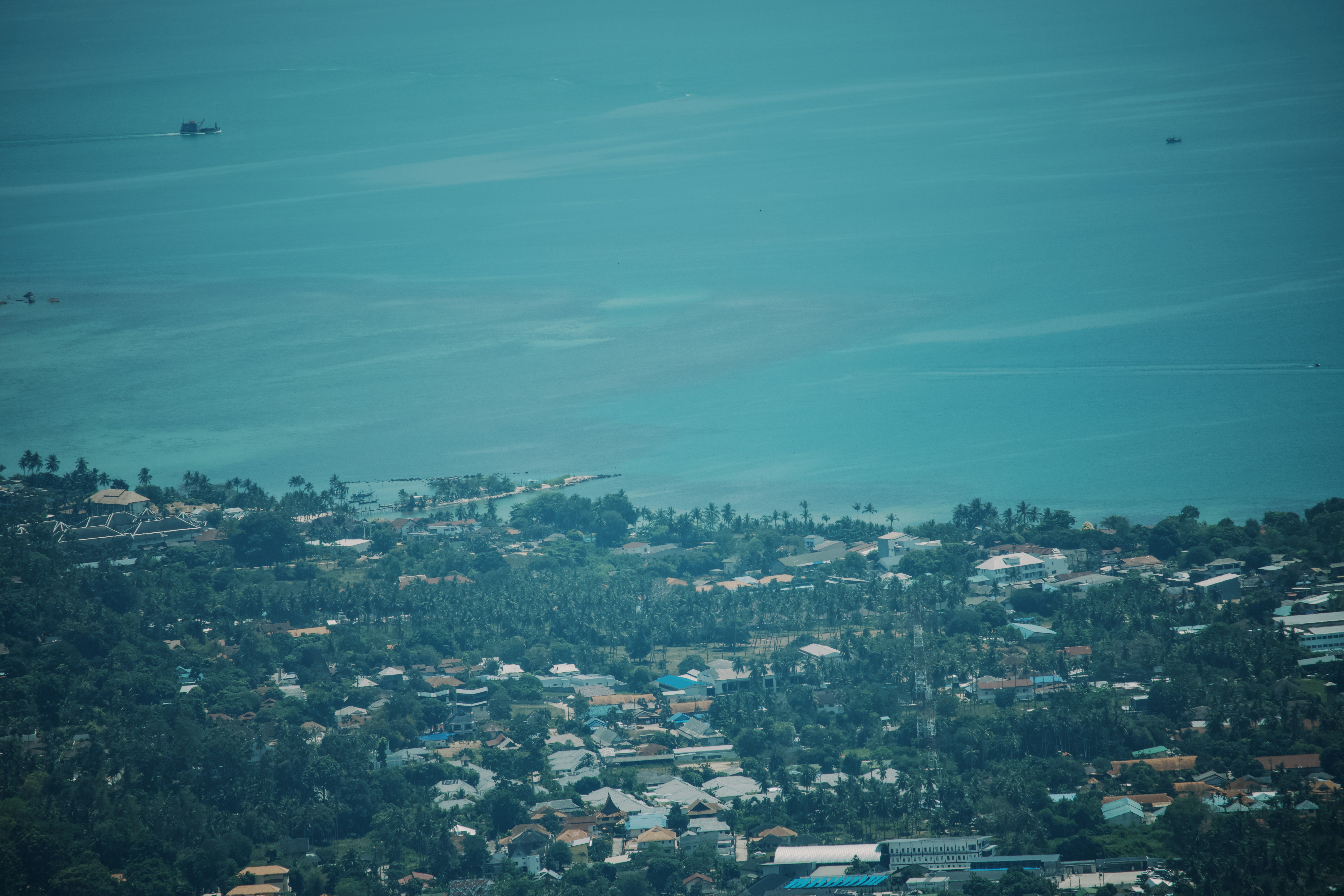 Coastal Town beneath a Turquoise Horizon