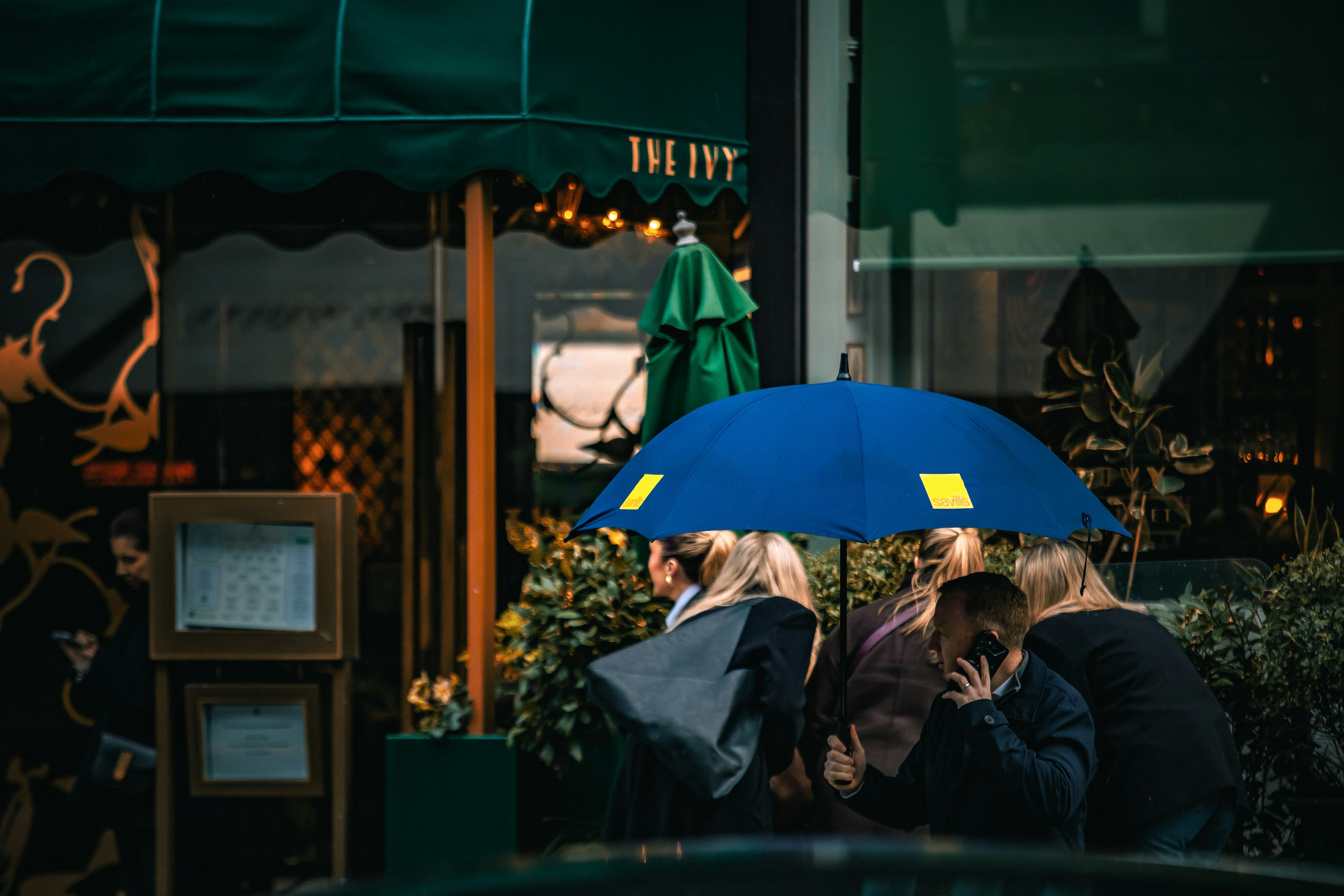 Umbrella over a Quiet Moment: City Corner