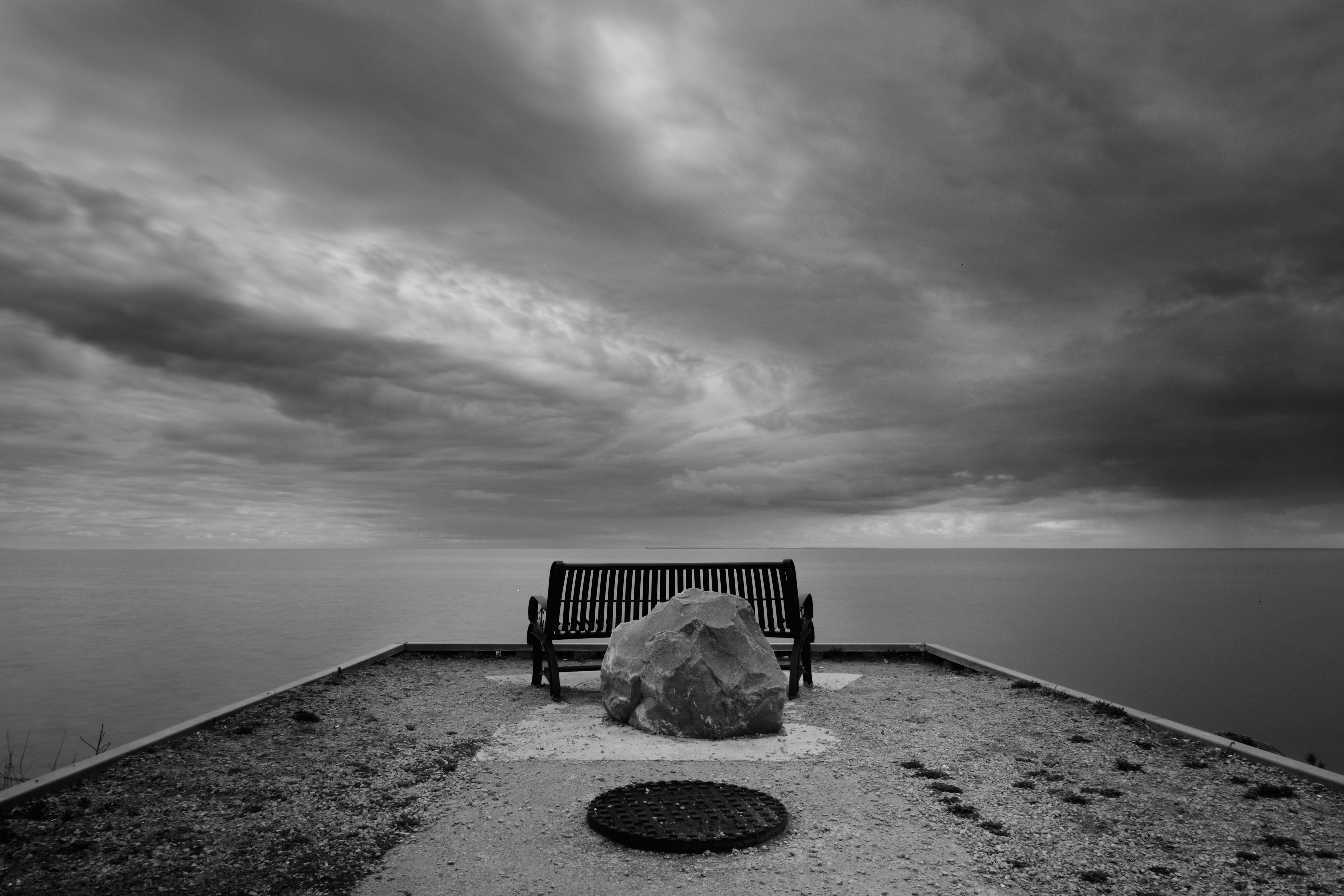 Bench at the Edge: Sea Quiet Before the Storm