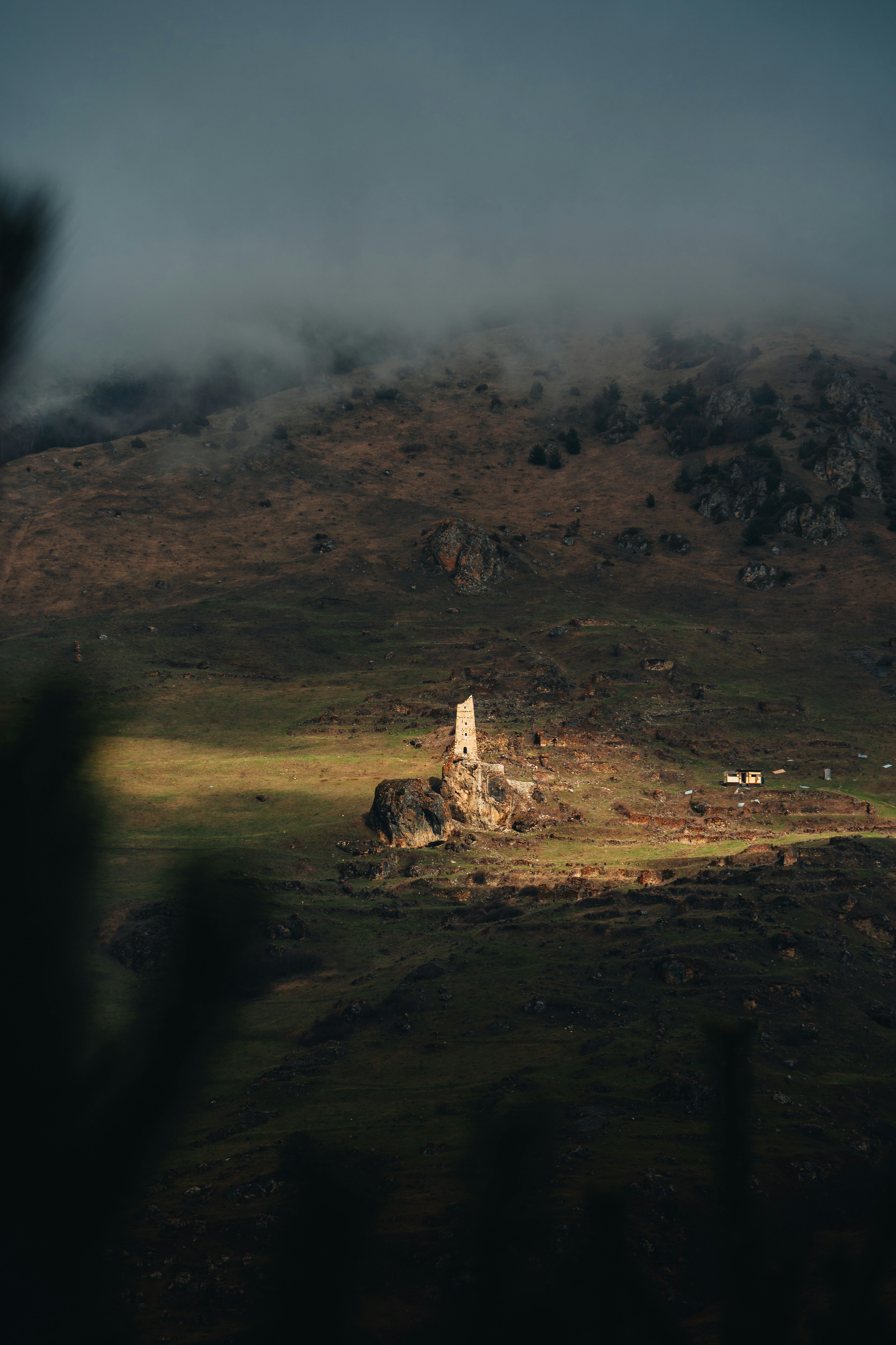 Tower in the Twilight: A Distant Monument on A Vast Moor