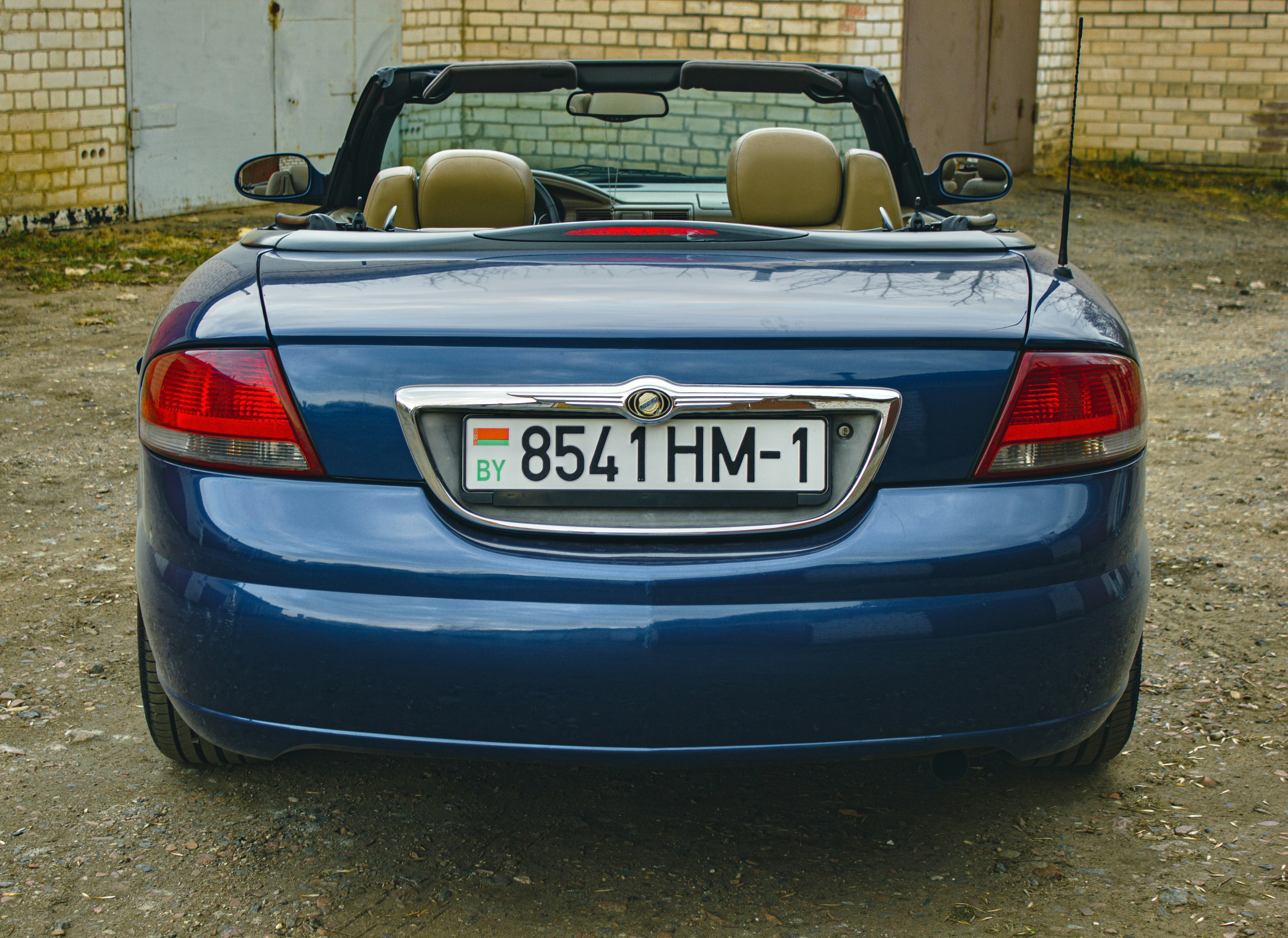 Blue Convertible's Quiet Comeback: The Car's Rear Story