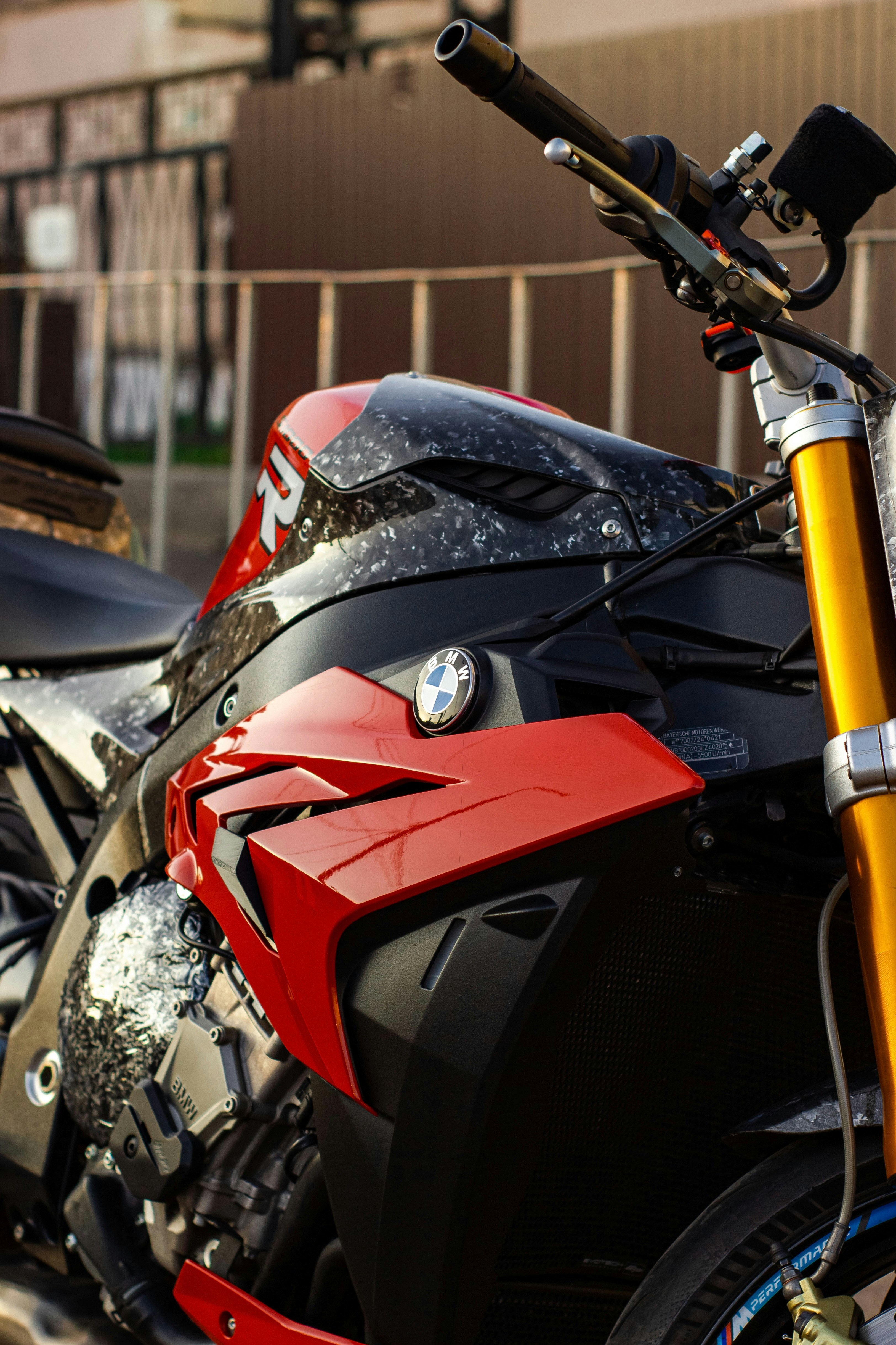 Red Accent, Black Frame: a BMW motorcycle battery of motion