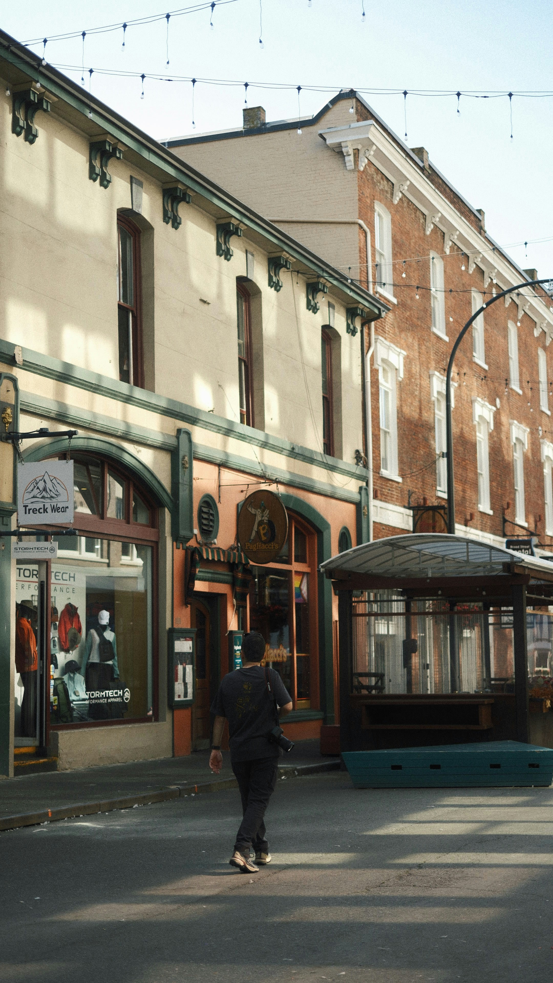 Footsteps through a Sunlit Victorian Street