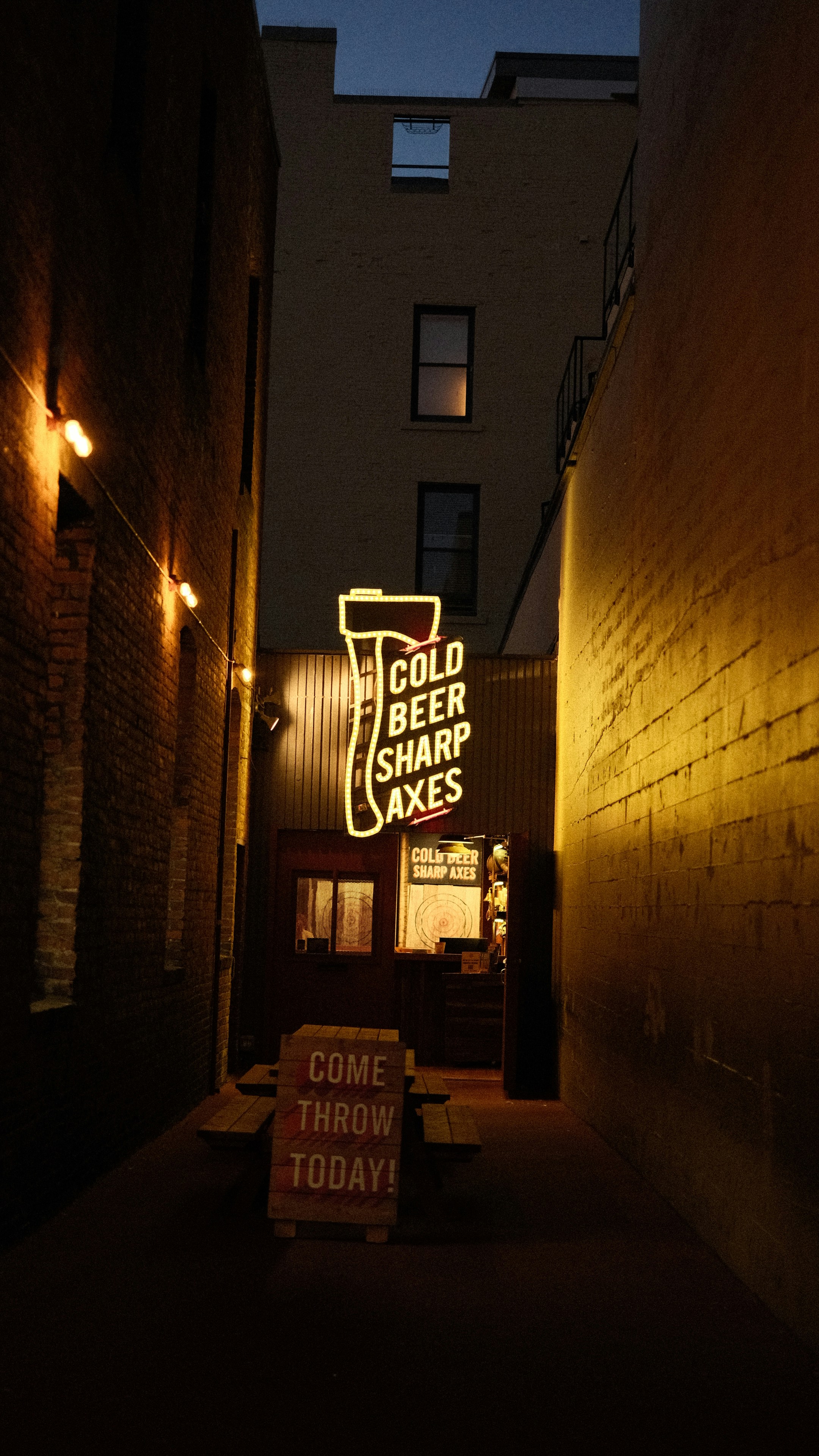 Neon Sign Alley: A Midnight Toast to Cold Beer and Sharp Axes