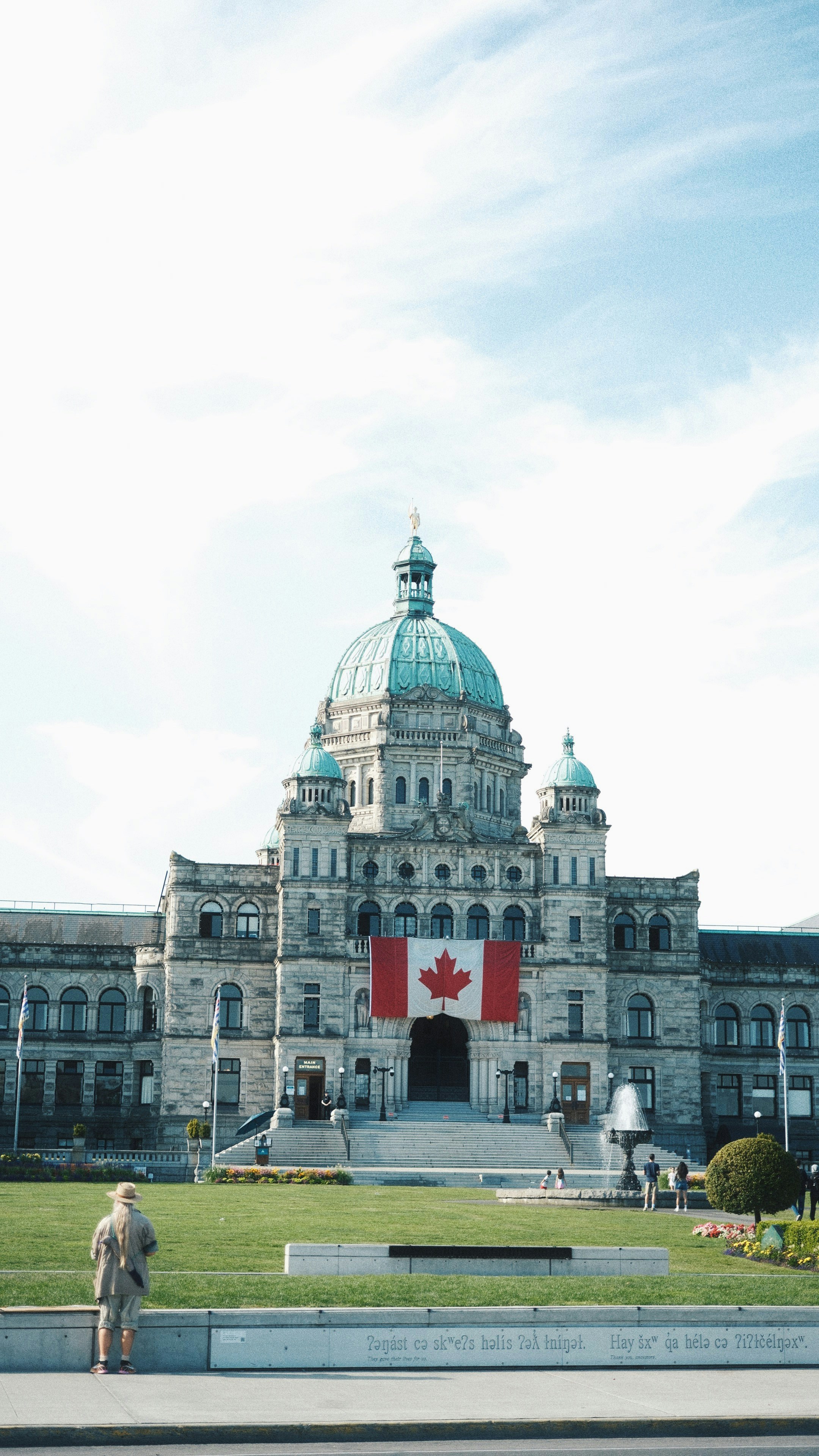 Beacon at the Steps: Canada’s Capitol Dome Crowned by a Flag