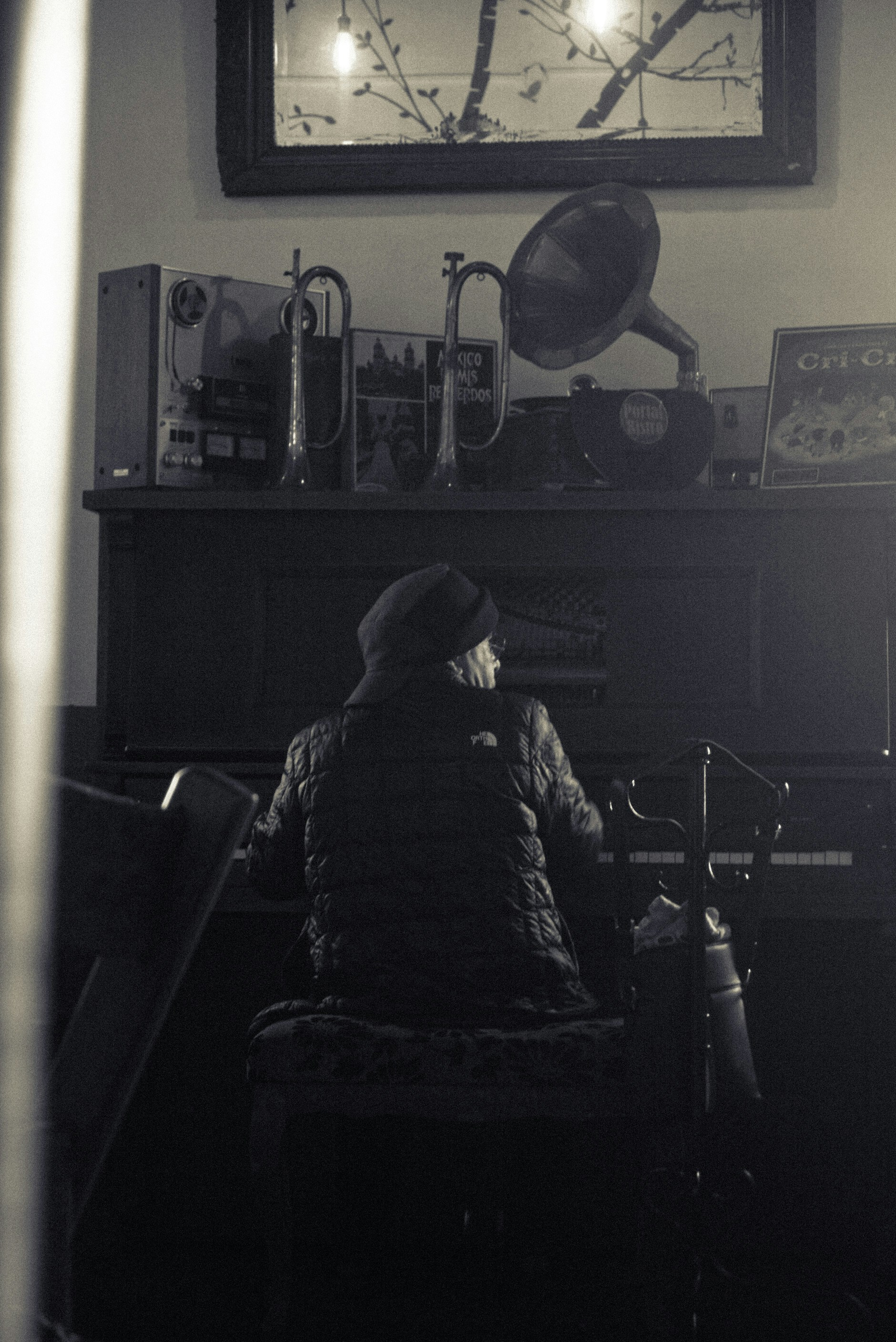 Muted Keys, Timeless Echoes: A Silhouette at the Piano