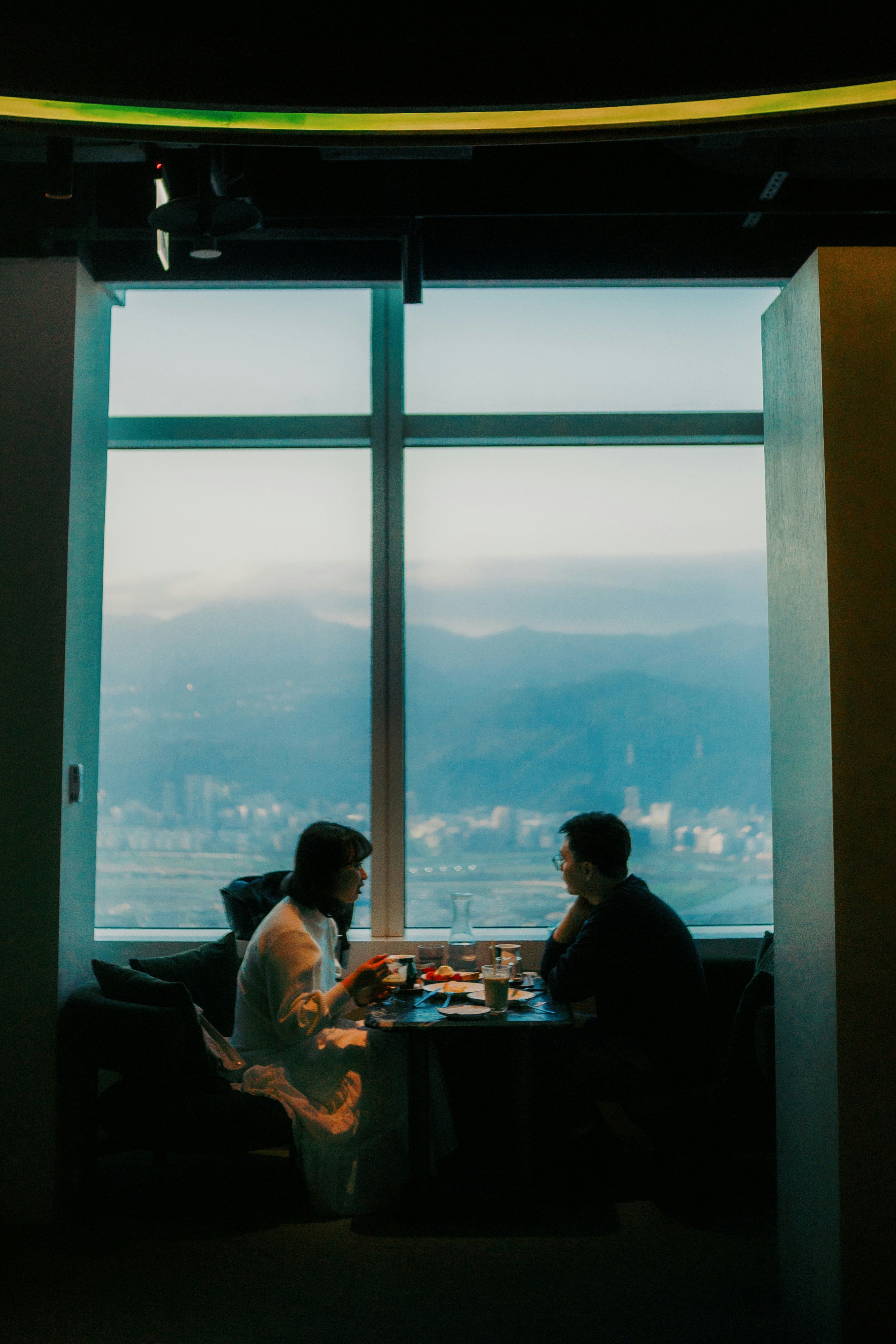 Conversations by the Window: Dim Light, Clear View
