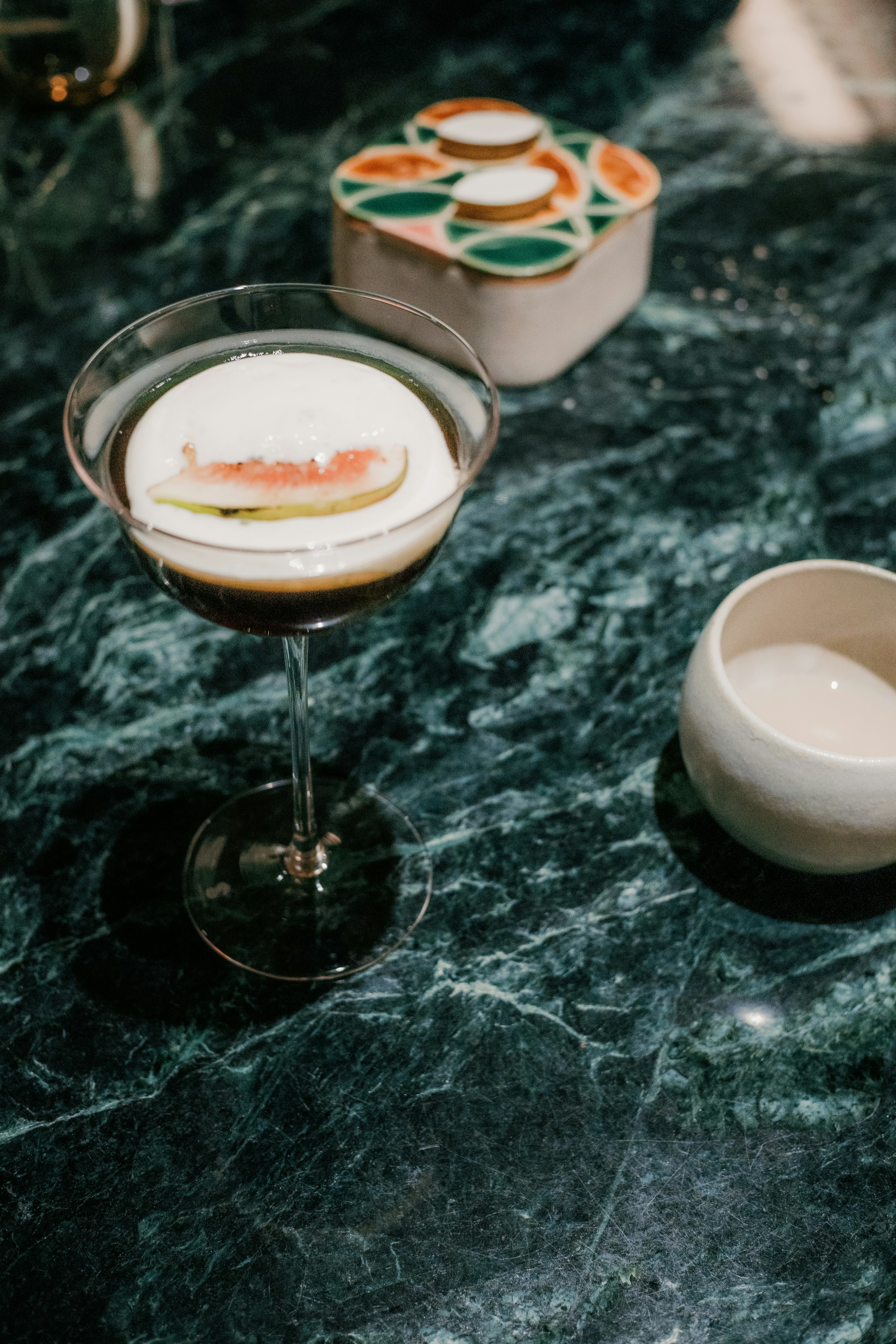 Veiled Nightcap on Marble Stage
