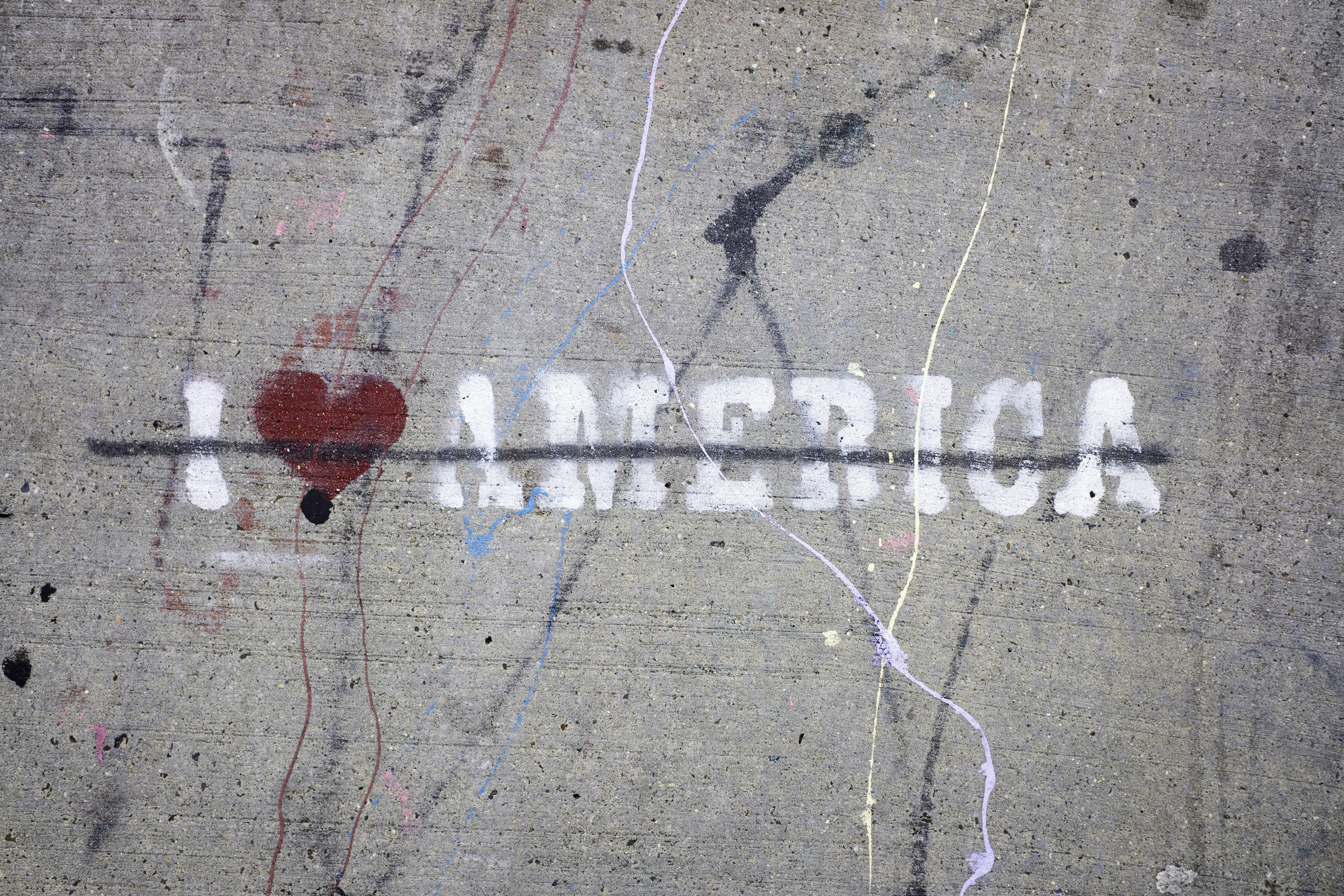 I Heart America: Graffiti Spray and Strings on Weathered Wall